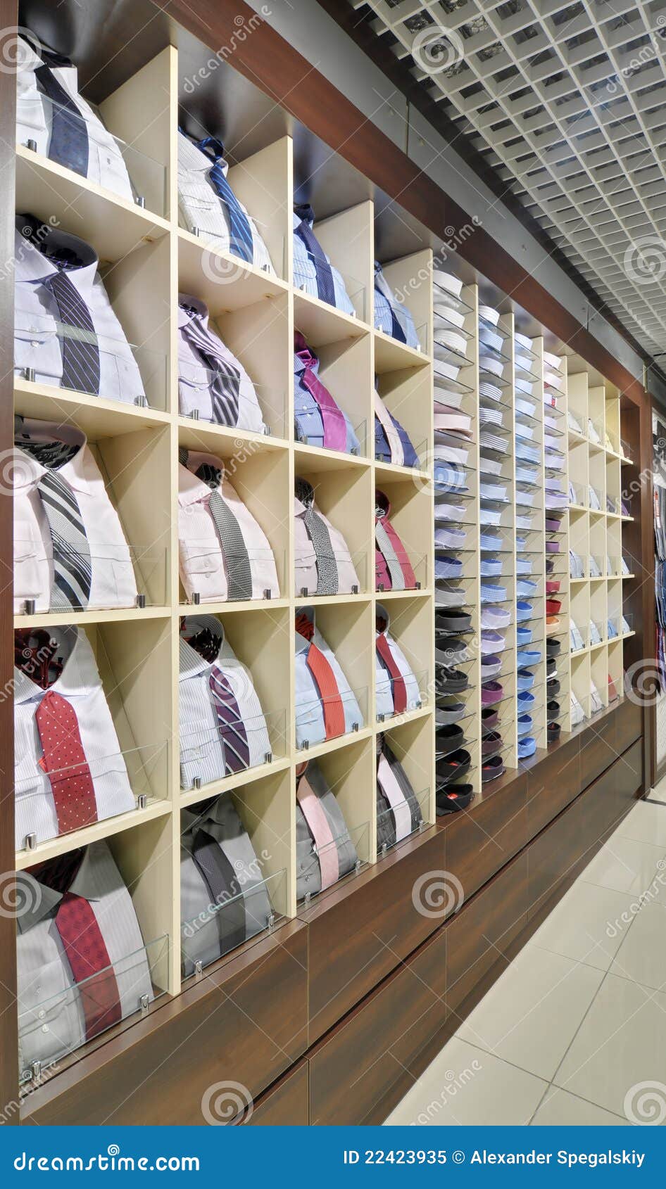 Shelf with shirts stock image. Image of laundry, professional - 22423935