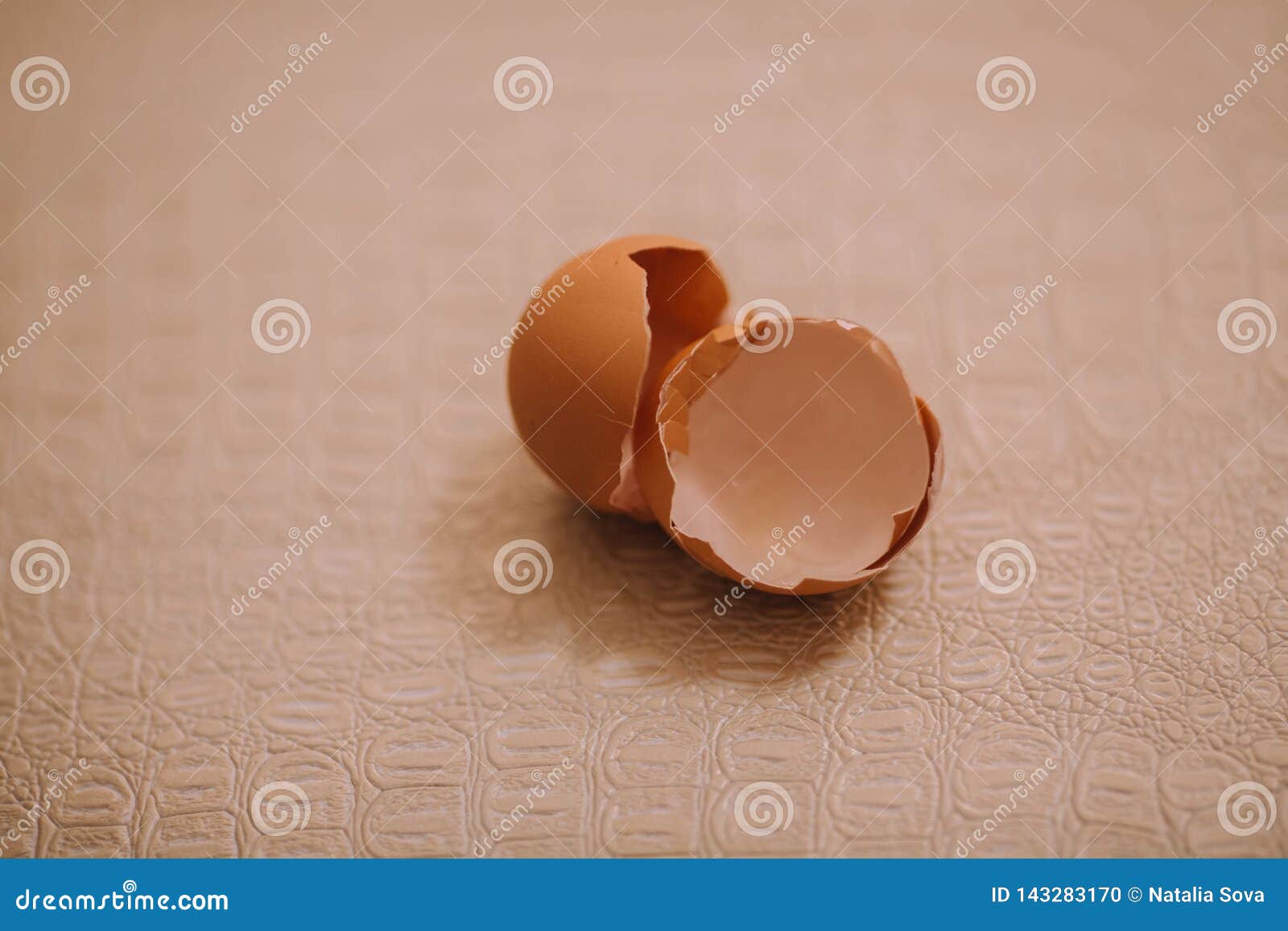 The Shell of a Beige Egg, Lying on the Kitchen Table. Stock Photo ...