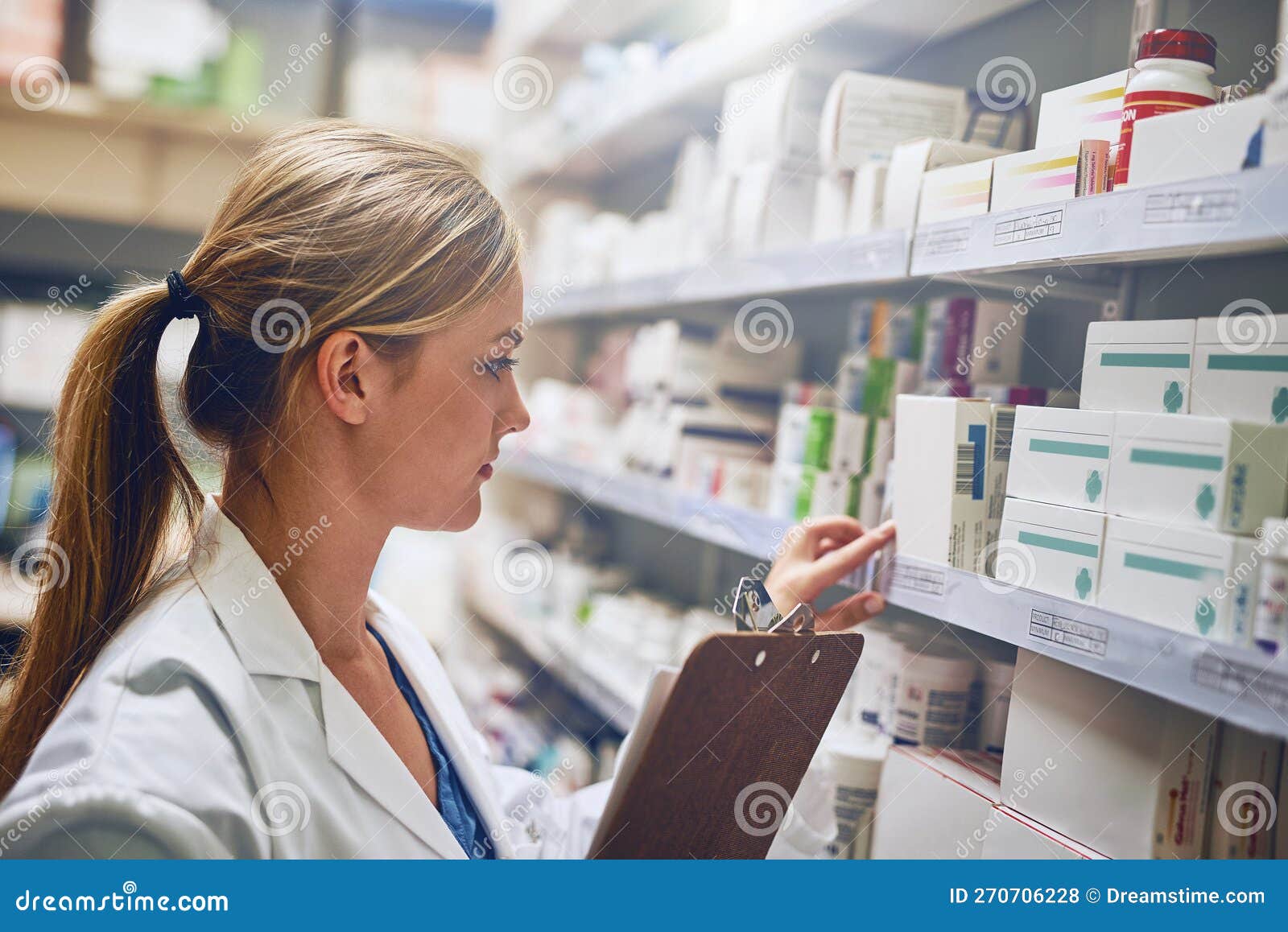 Shell Change Your Live for the Better. Shot of a Pharmacist Looking at ...