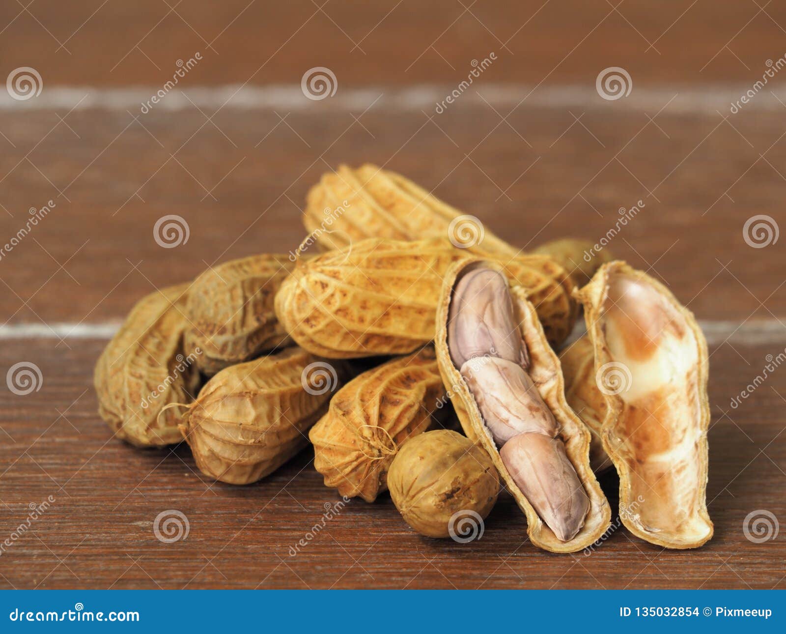 Shell Cracked Steamed Peanut Pile on Wooden Plank Table Top. Stock ...