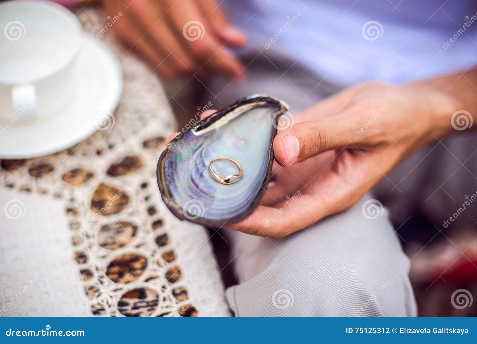 Shell with Engagement Ring Inside Stock Photo - Image of petal ...
