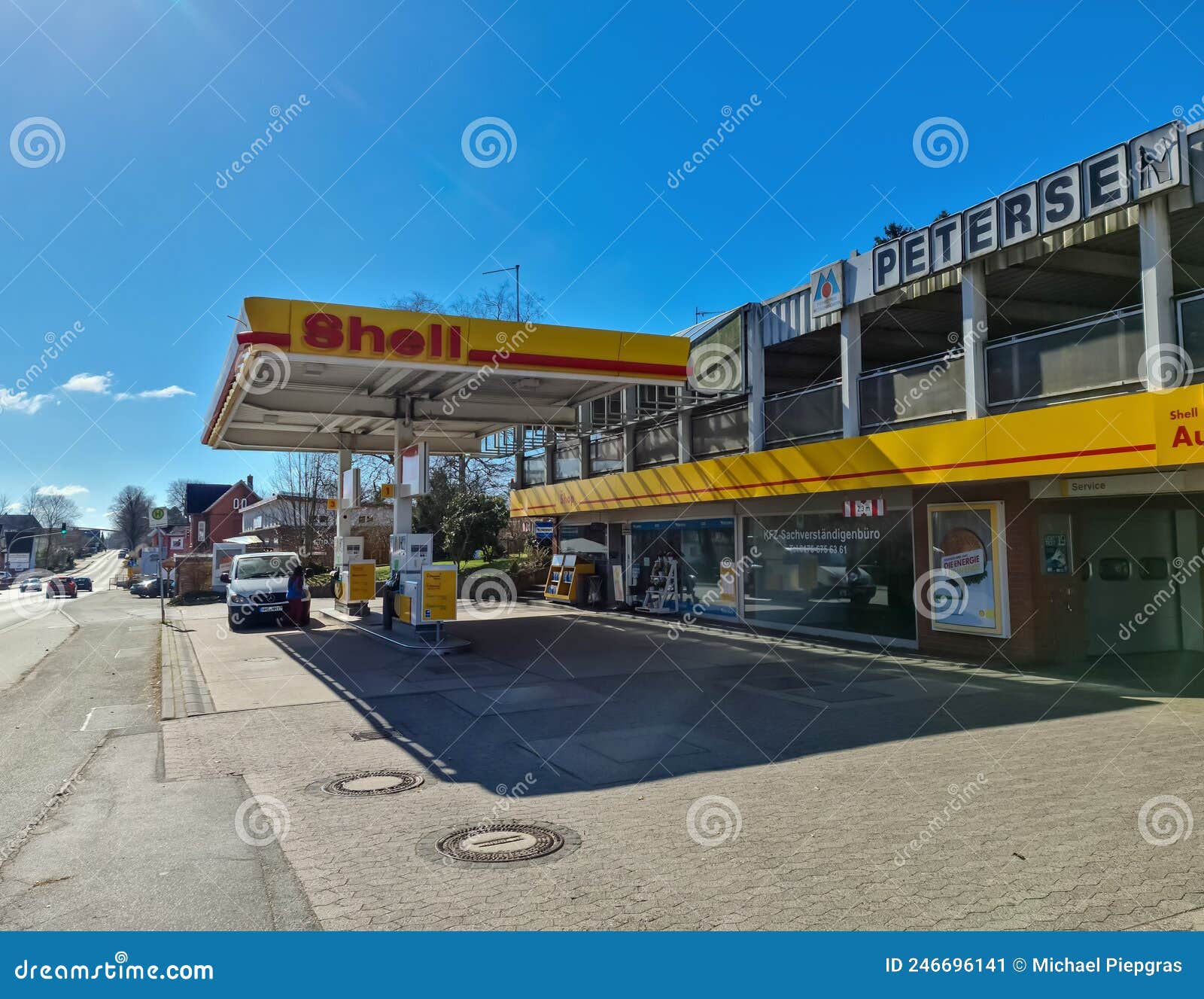 A Shell Gas Station with Customers on a Sunny Day Editorial Photo ...