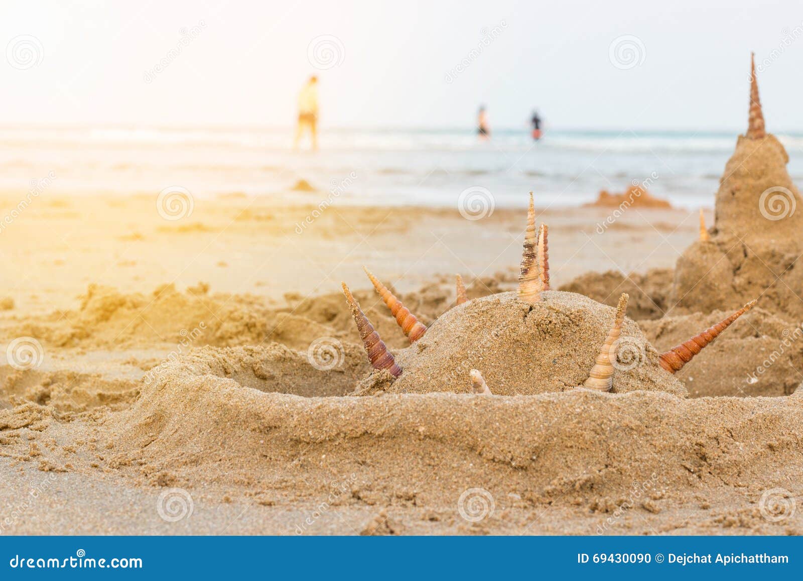 Shell Sand Castles on the Beach Stock Photo - Image of bucket, sunlight ...