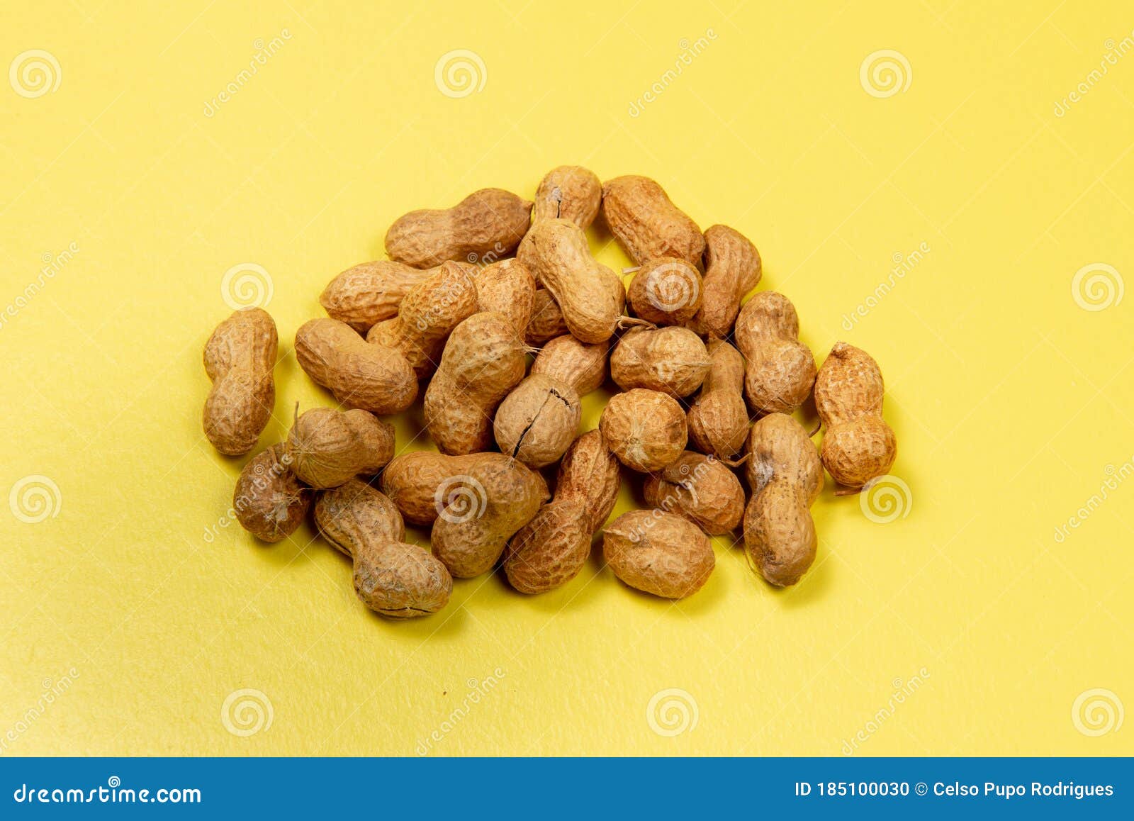 Shelled Peanuts on Yellow Background Stock Photo - Image of closeup ...