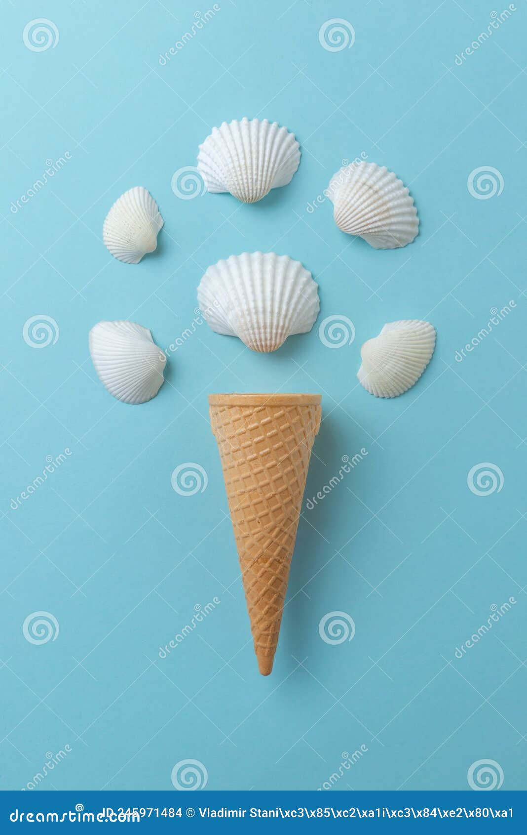 Shellfish Ice Cream Concept on Blue Surface. Ice Cream Cone with White ...