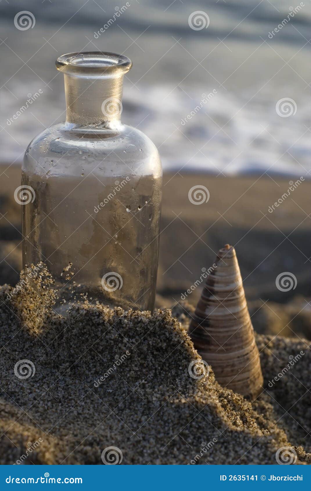 Shells and a bottle stock image. Image of peace, sand - 2635141