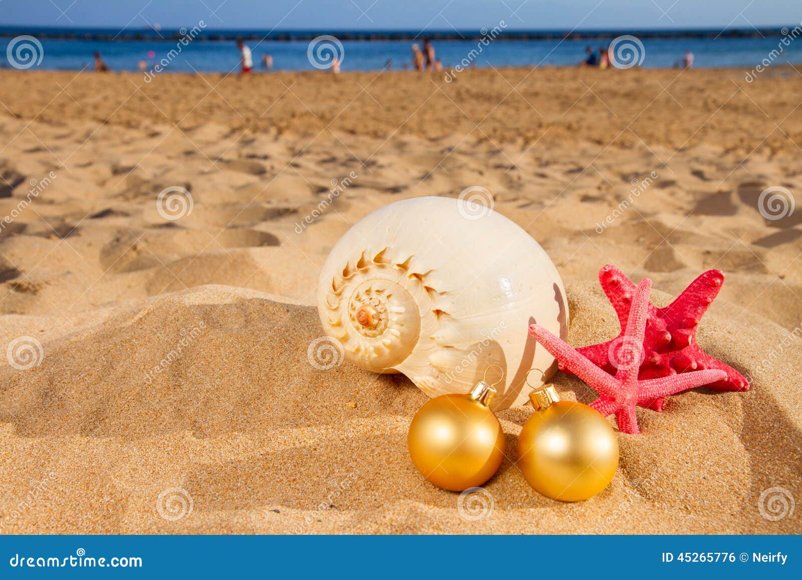 Shells and Christmas Decorations on Beach Stock Photo - Image of sand ...