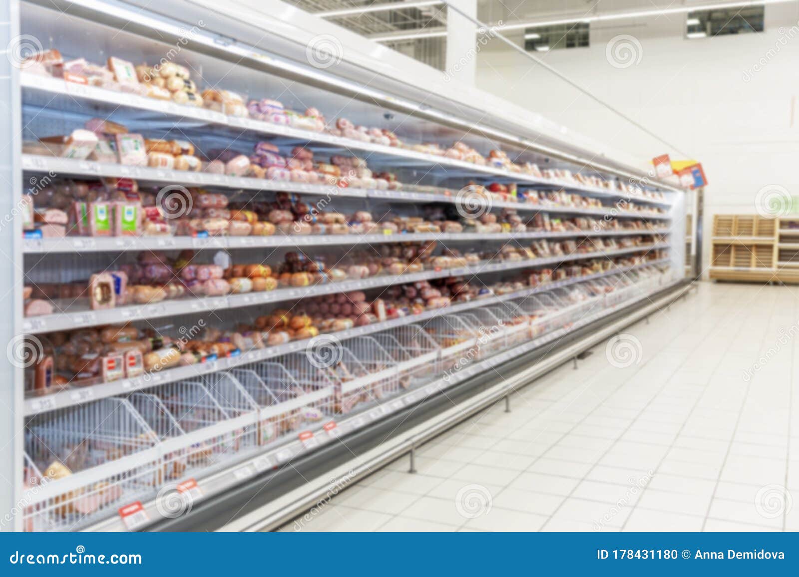 Shelves with Chilled Products in the Supermarket. Blurred Stock Photo ...