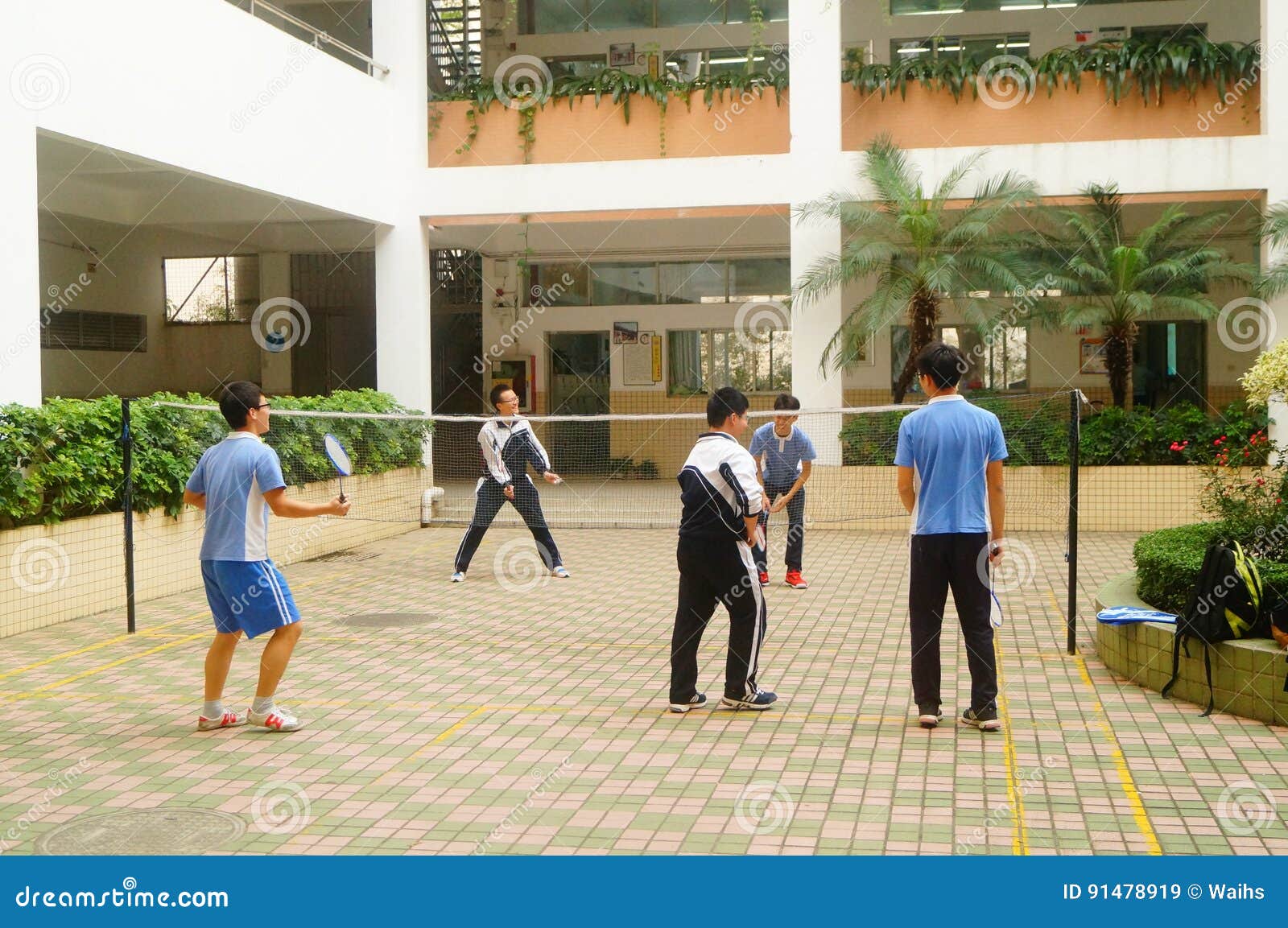 Shenzhen, China: Middle School Students Playing Badminton Editorial ...
