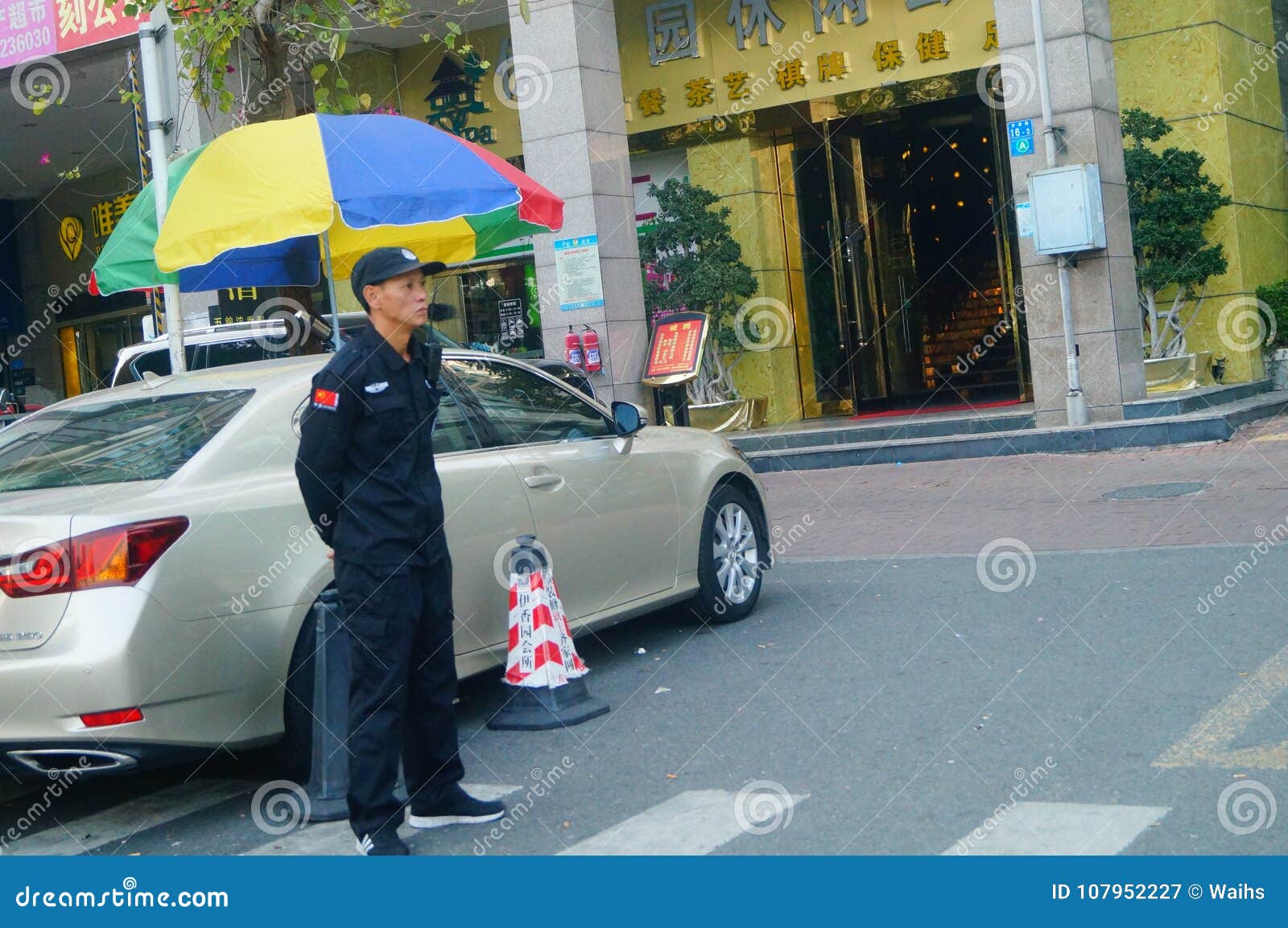 Shenzhen, China: a Security Guard in a Residential District Editorial ...