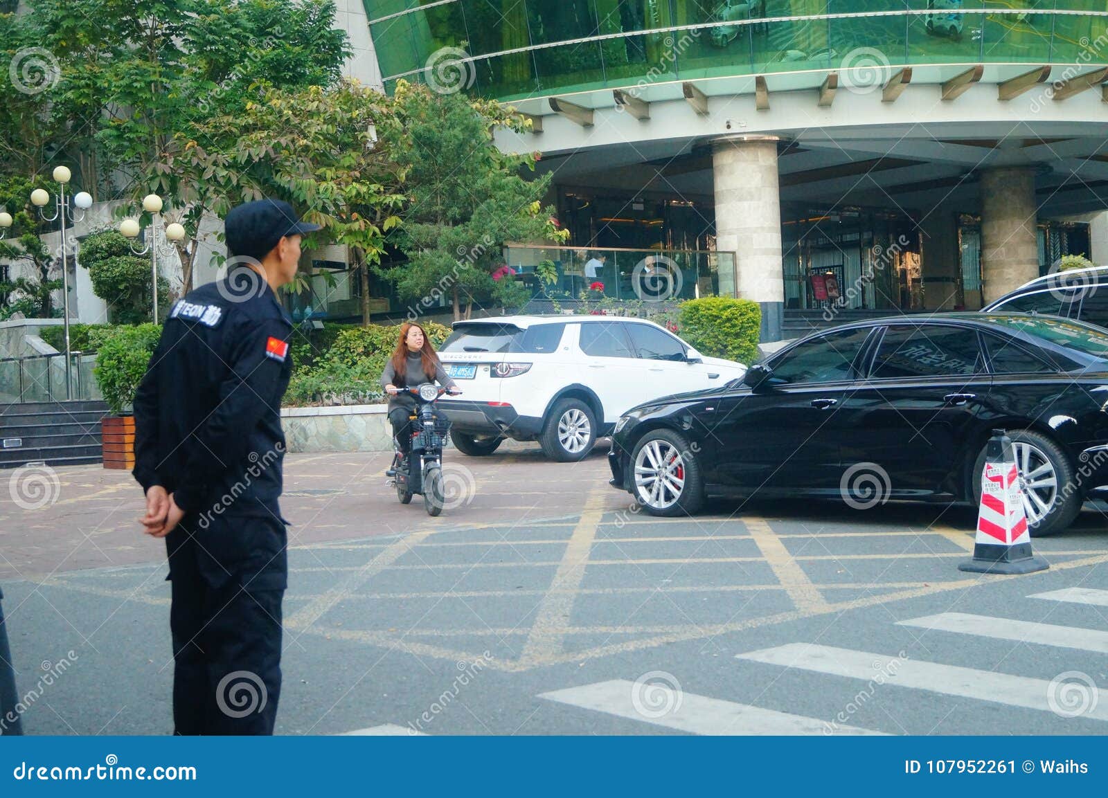 Shenzhen, China: a Security Guard in a Residential District Editorial ...