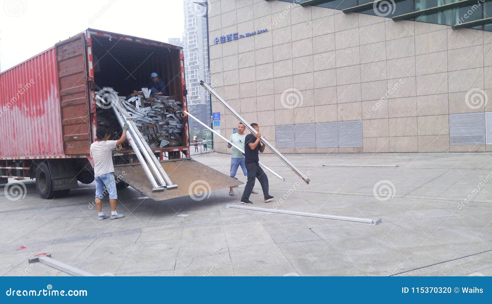 Shenzhen, China: Workers are Unloading Building Materials for ...