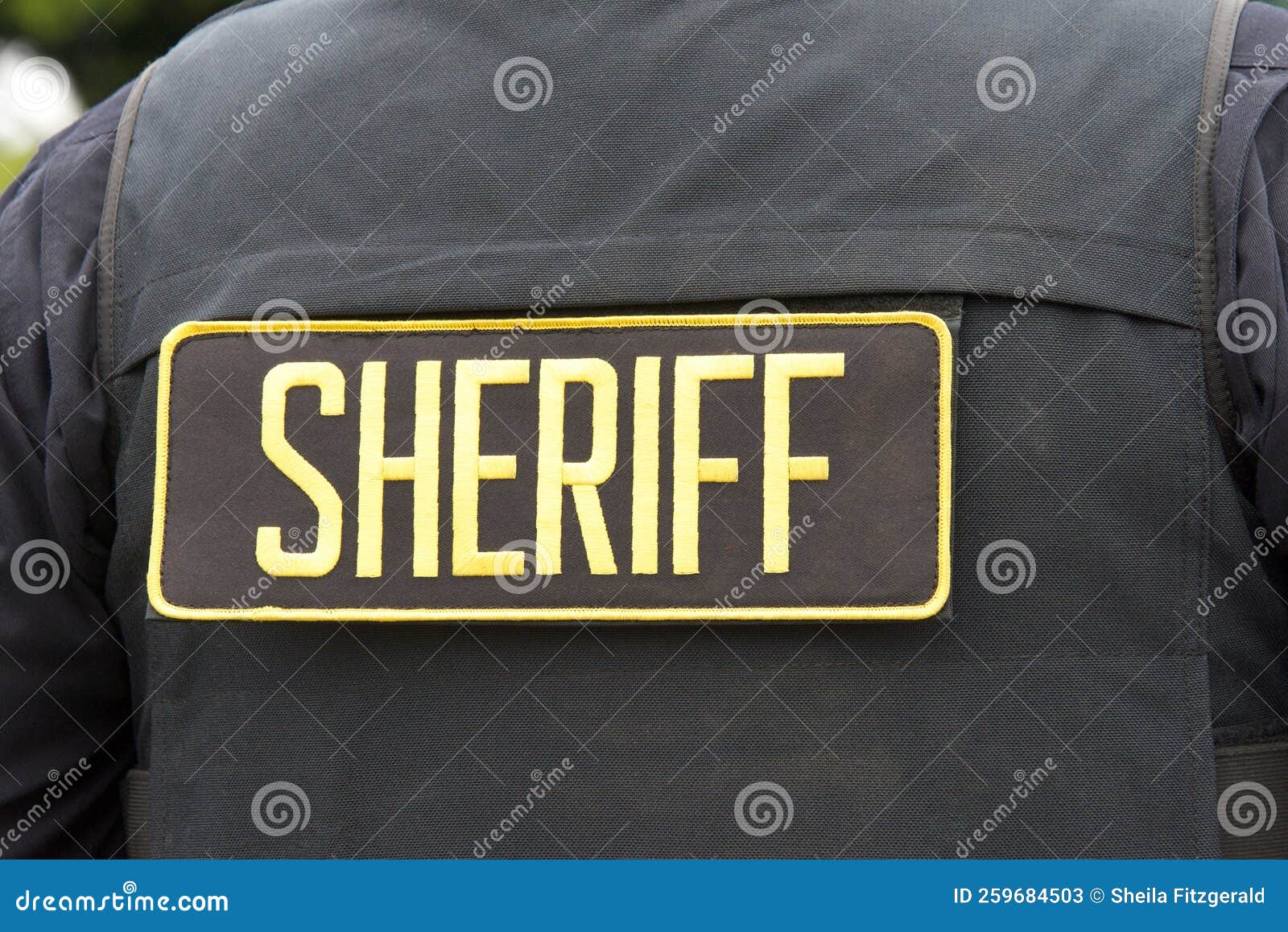 Sheriff Letters on Back of a Flack Jacket, Close Up Stock Image - Image ...