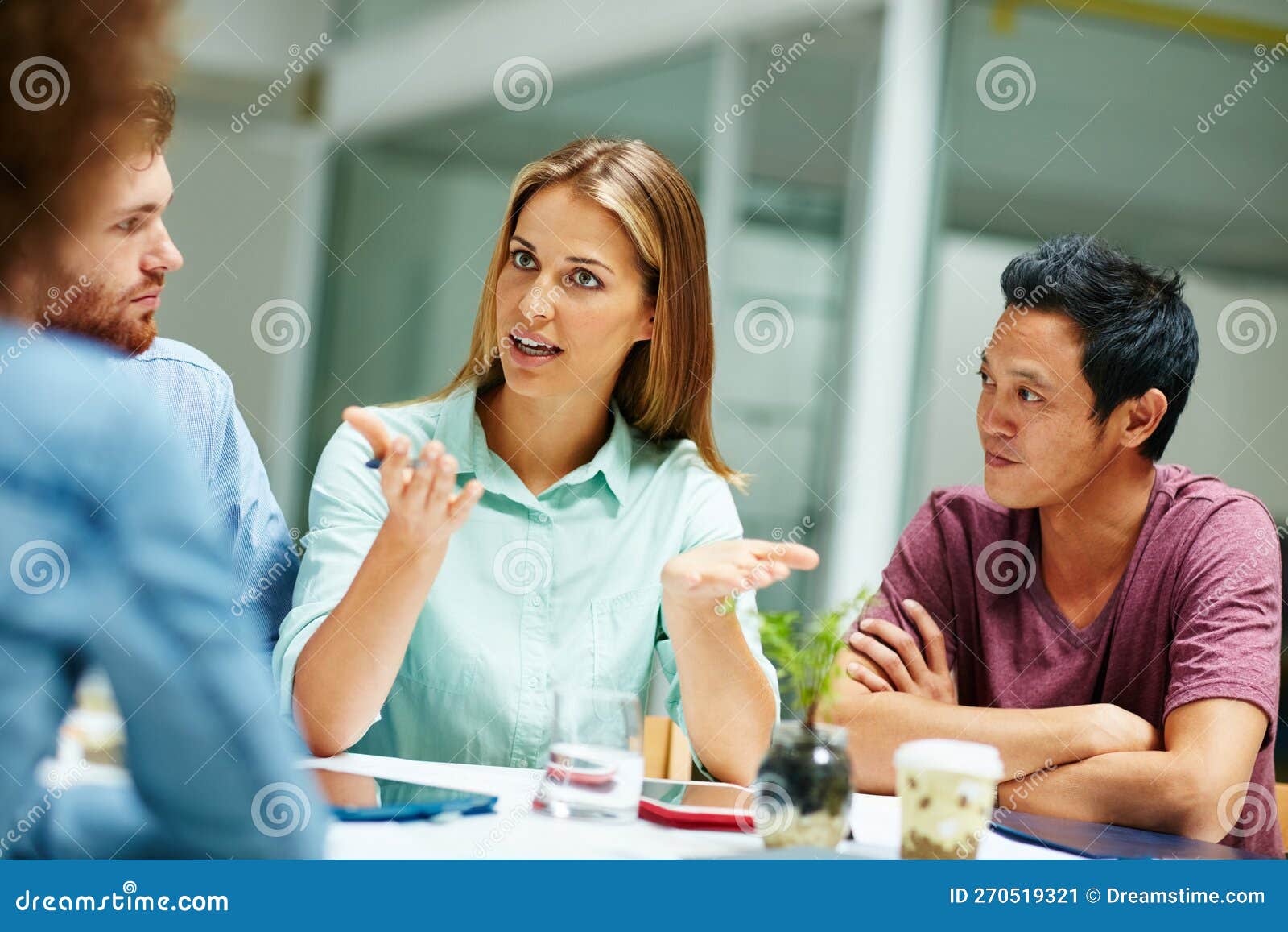 Shes the Boss with a Plan. a Group of Businesspeople Talking Together ...