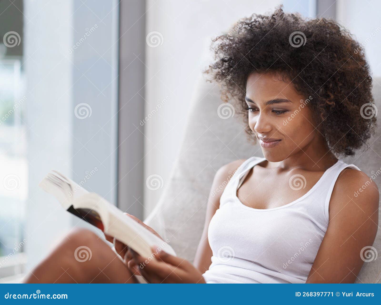 Shes Completely Entranced by this Book. a Beautiful Woman Reading a ...