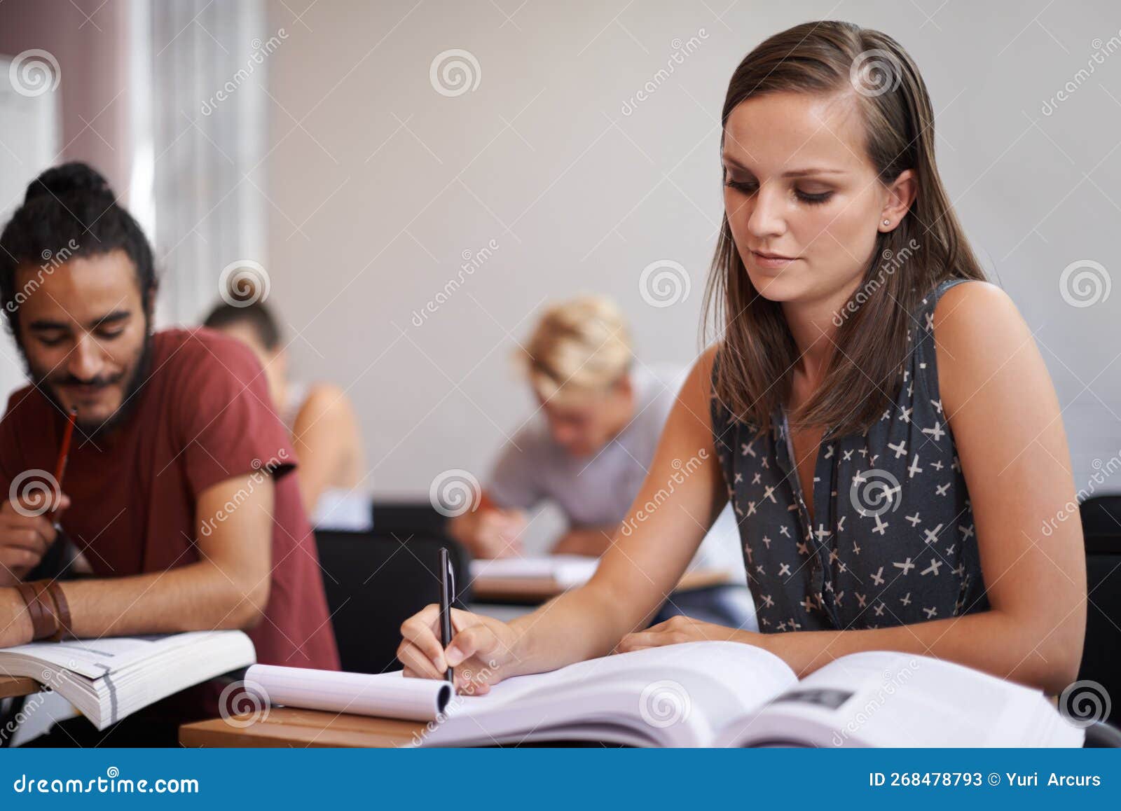 Shes Completely Focused. an Attractive Young Varsity Student Sitting in ...