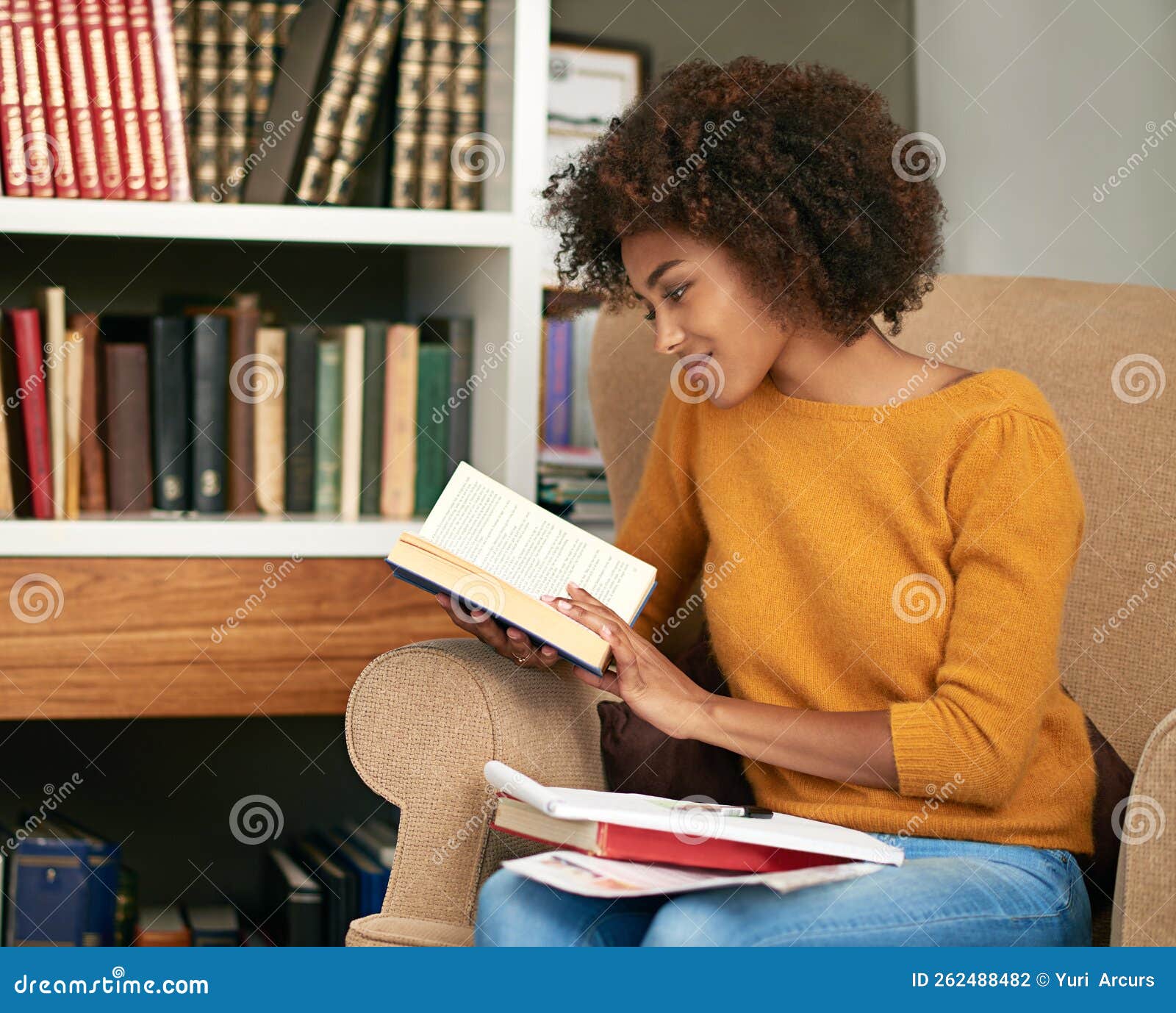 Shes a Diligent Student. a Young Woman Studying on Her Sofa. Stock ...