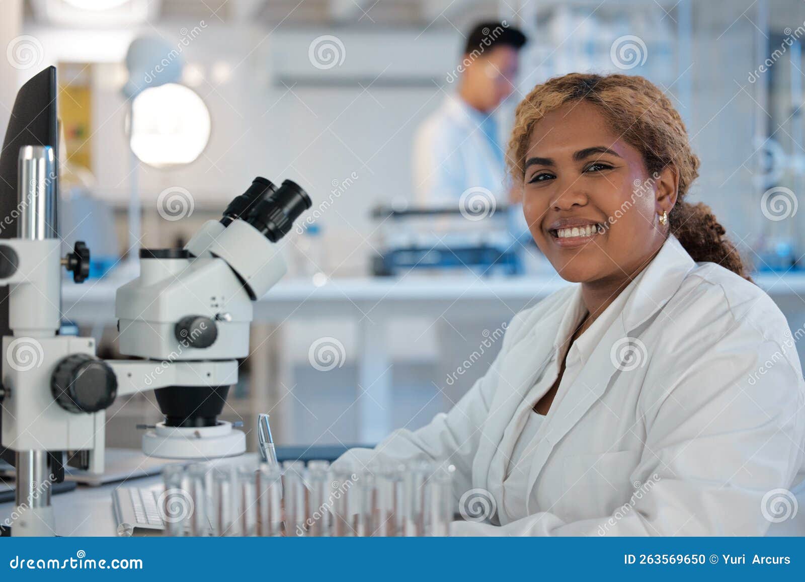 Shes always on the Forefront of Discovery. a Young Female Lab Worker in ...