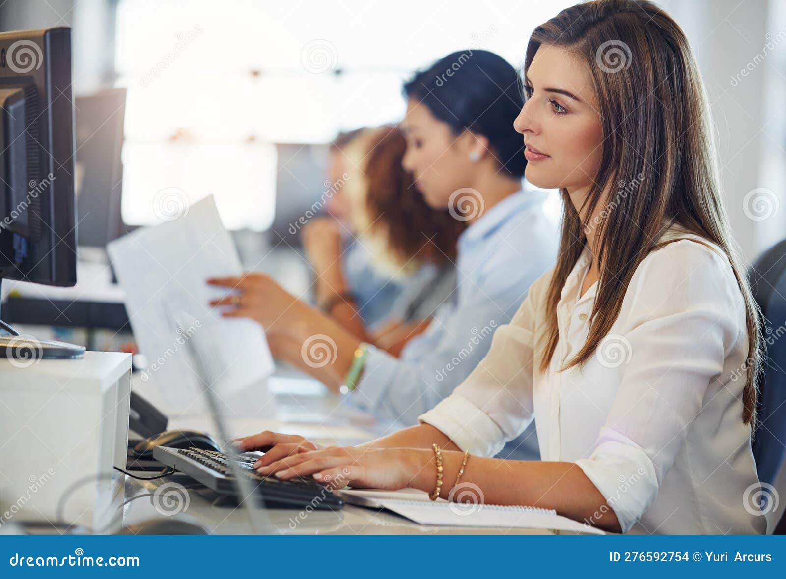 Shes Getting into the Project. a Group of Businesspeople Working in the ...