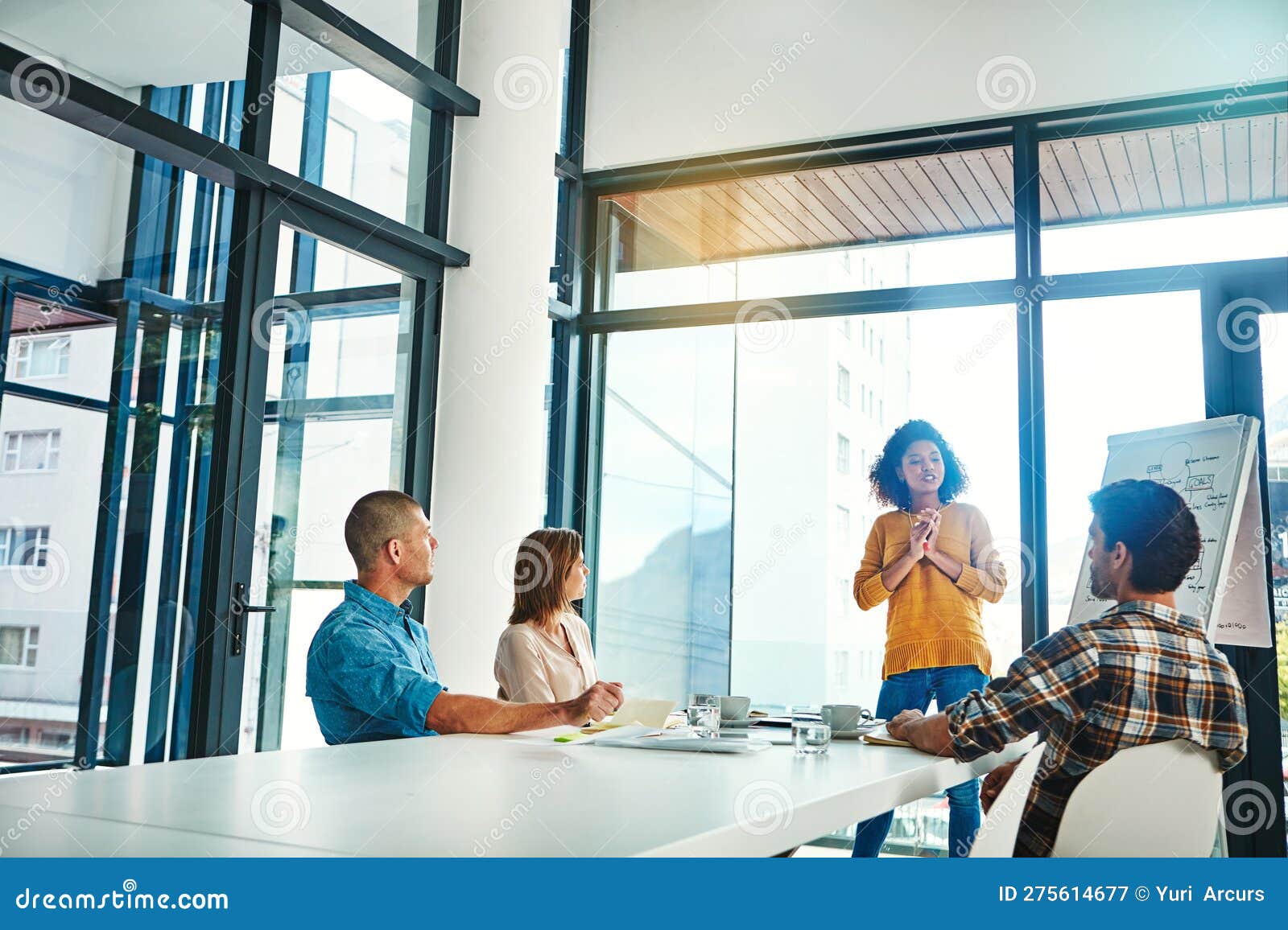 Shes Got an Answer for Every Question. Colleagues Working Together in a ...