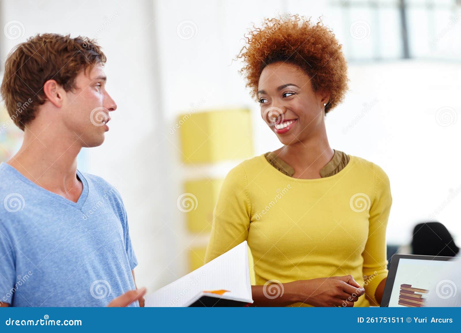 Shes Happy with His Work. Two Young Colleagues Working in the Office ... Shes Happy with His Work. Two Young Colleagues Working in the Office ...