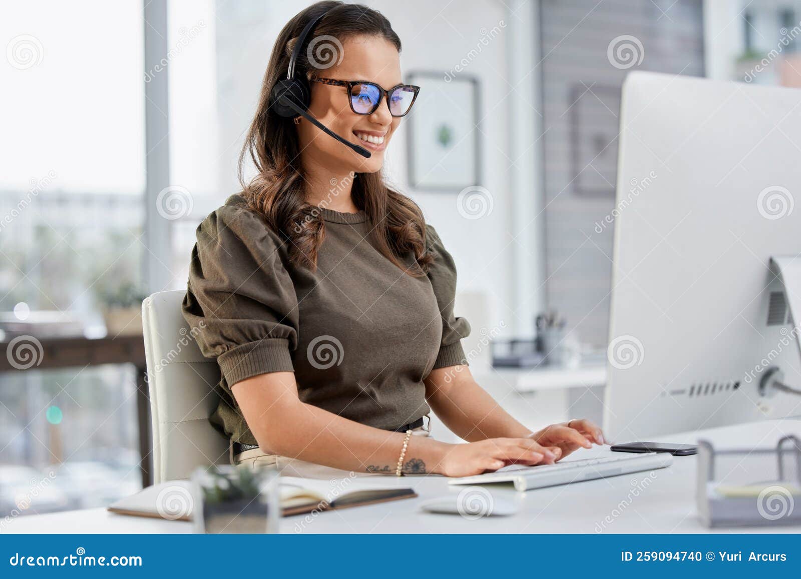 Shes a Problem Solver. an Attractive Young Female Call Center Agent ...