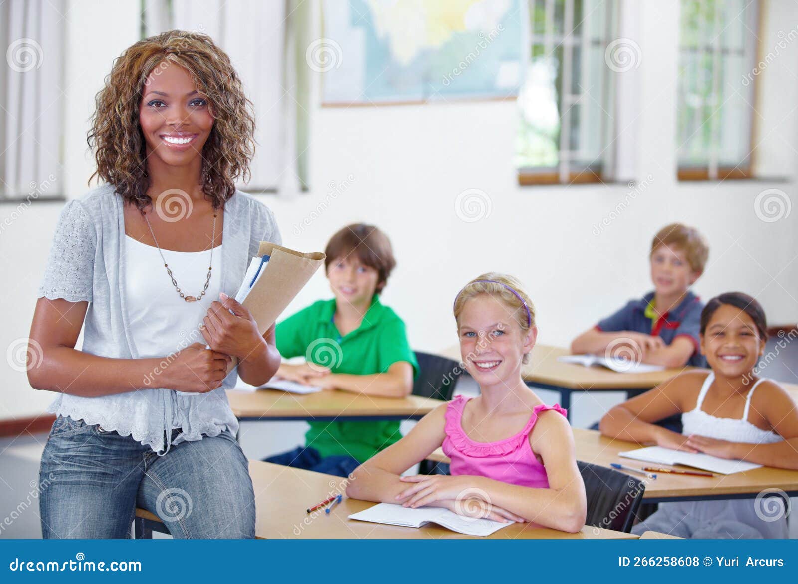 Shes Proud of Her Classroom. Portrait of an Attractive Young Teacher ...