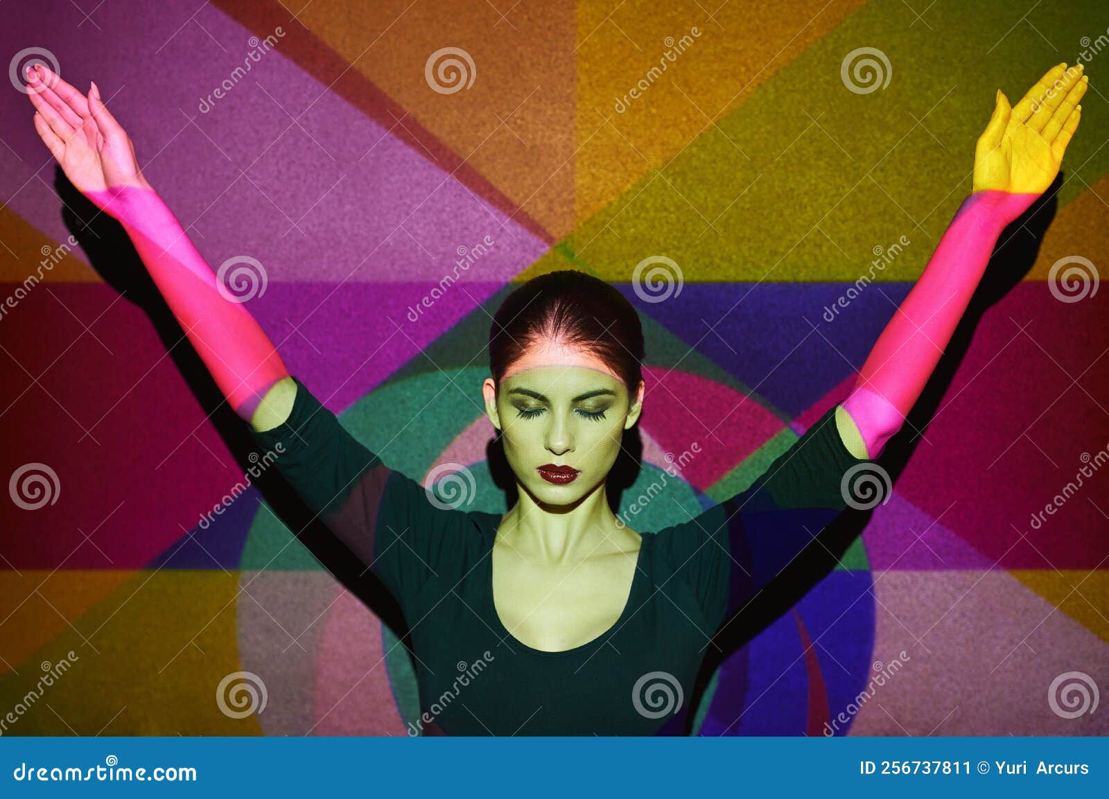 Shes the Queen of Color. a Beautiful Model in the Studio Covered with a ...