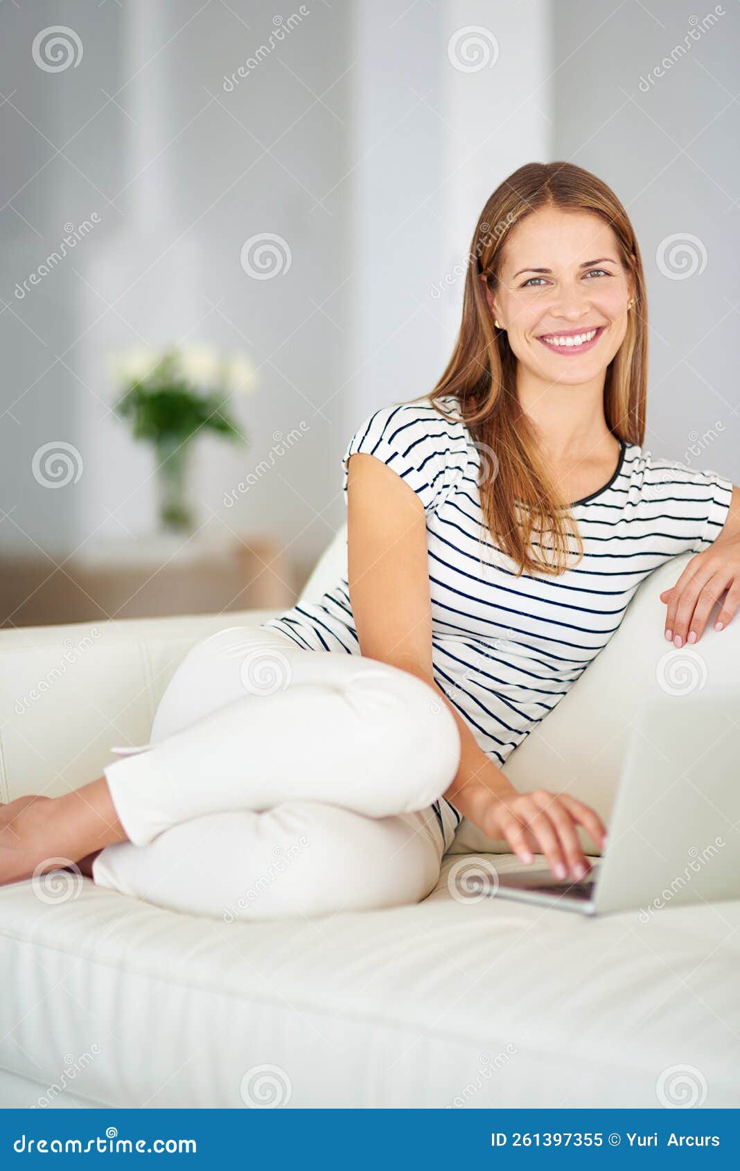 Shes a Tech Savvy Web Surfer. a Young Woman Browsing the Internet at ...