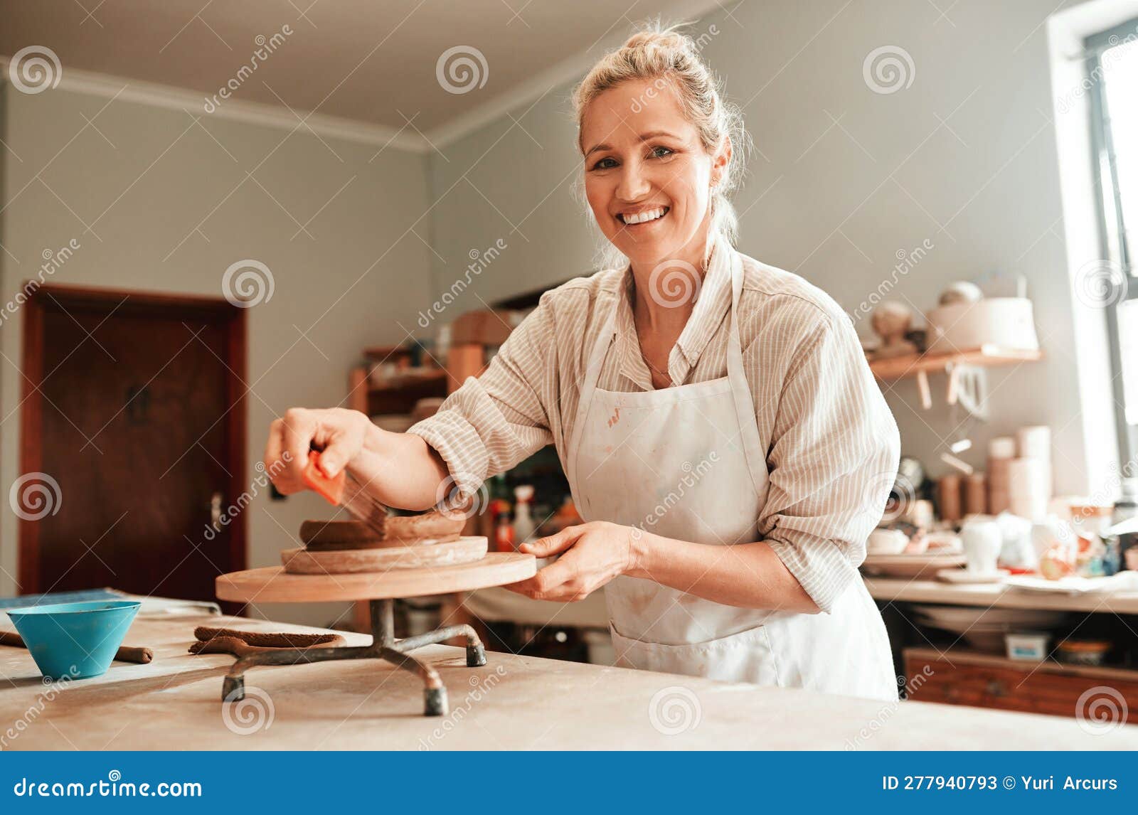 Shes a True Master of the Art. a Female Artisan Working in Her Pottery ...