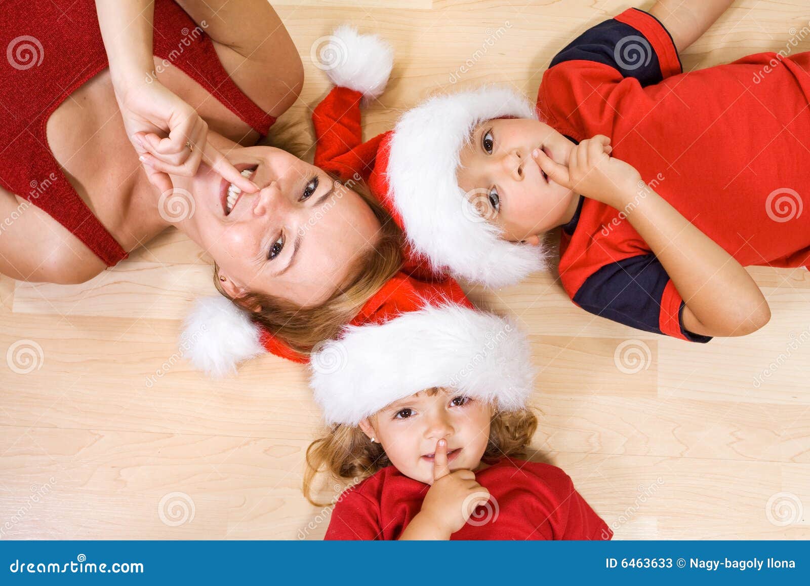 Shhh, Santa is coming.... stock image. Image of heads - 6463633