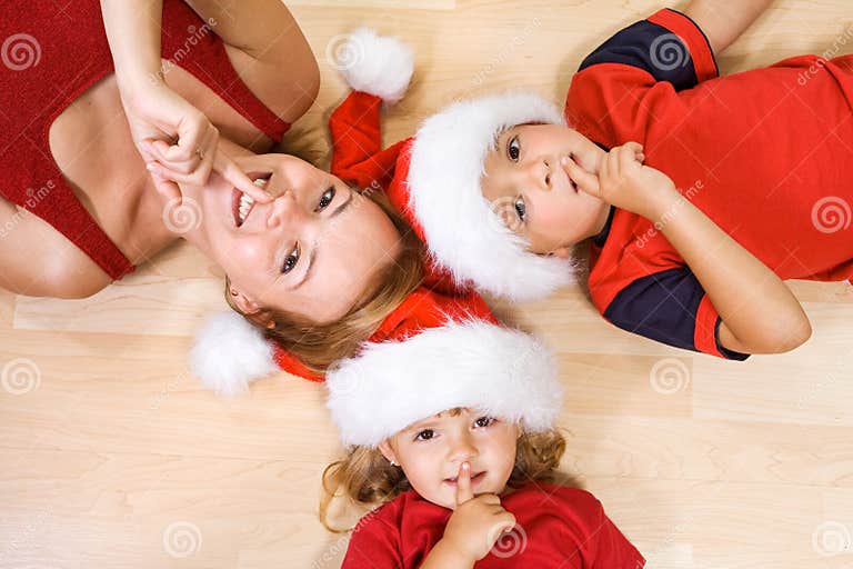 Shhh, Santa is coming.... stock image. Image of heads - 6463633