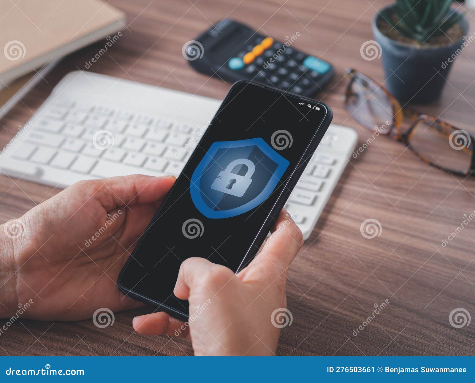 Shield Icon and Padlock on User Smartphone Screen Authentication before ...
