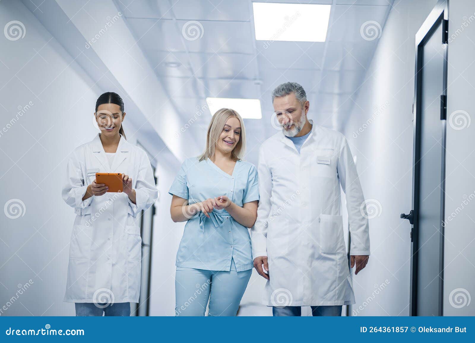 Group of Doctors in the Clinic Corridor Stock Image - Image of ...