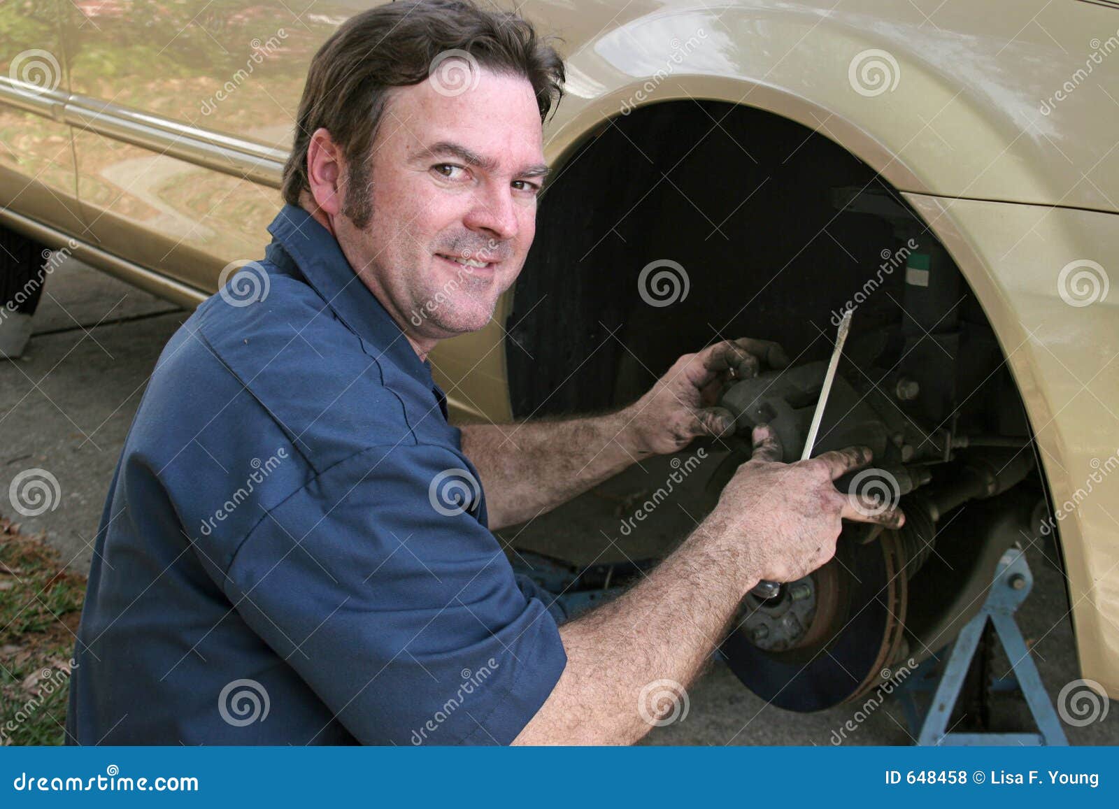 Shifty Mechanic stock photo. Image of labor, people, brake - 648458
