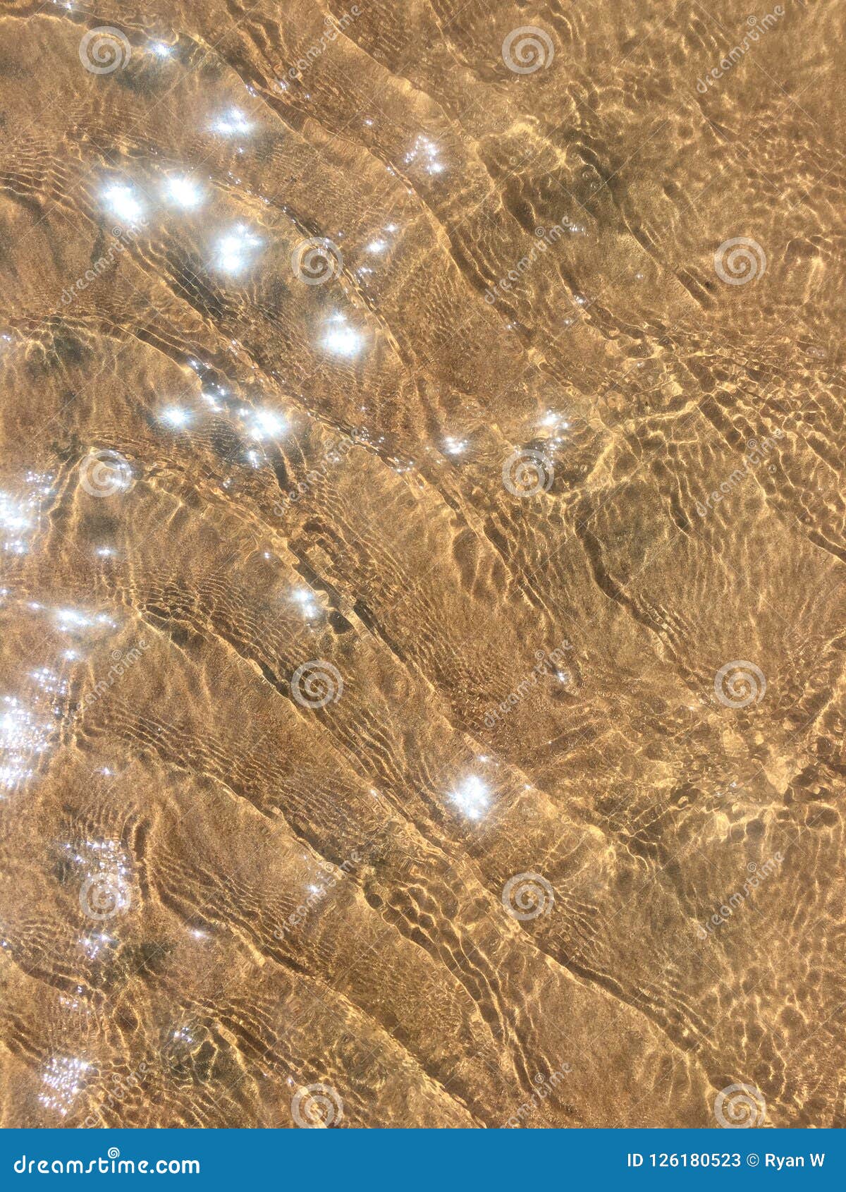 Shimmering water on sand stock image. Image of water - 126180523