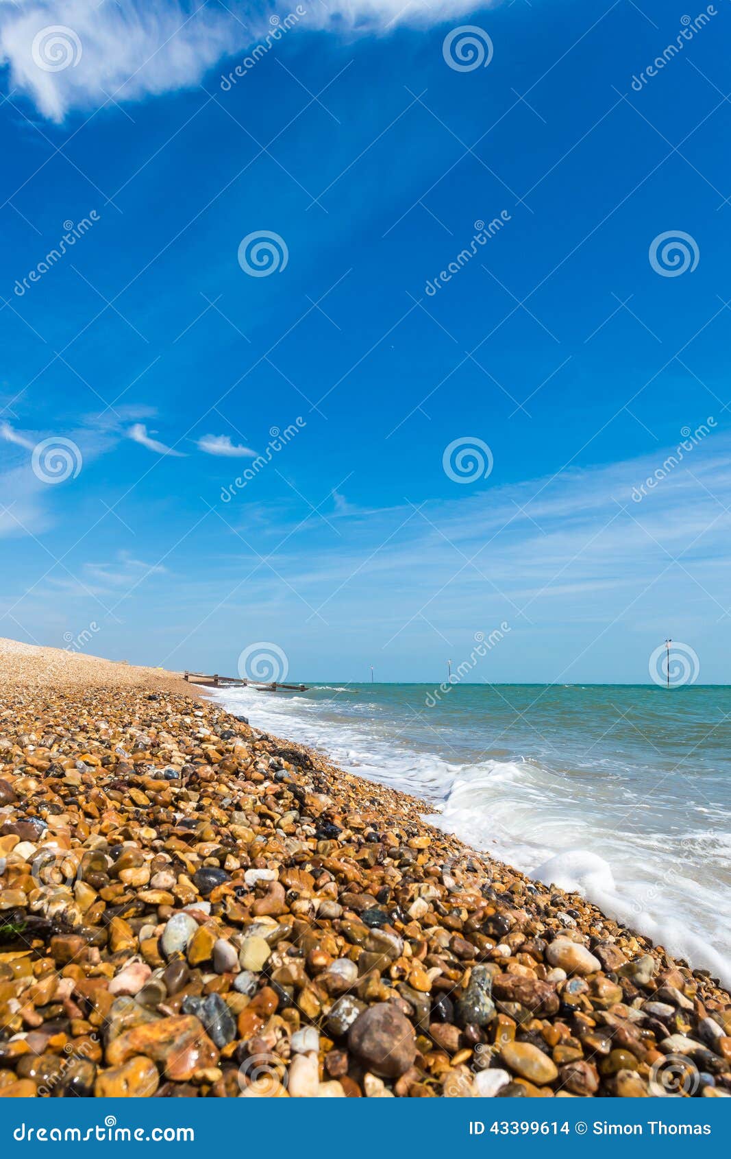 Shingle Shore Beach stock photo. Image of clouds, water - 43399614