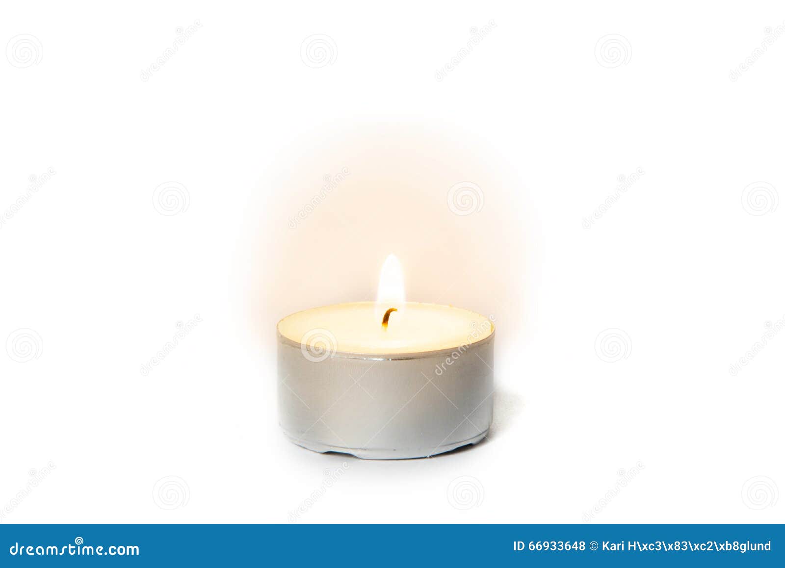 Shining Flame on a Tea Light Candle Stock Photo - Image of color, metal ...