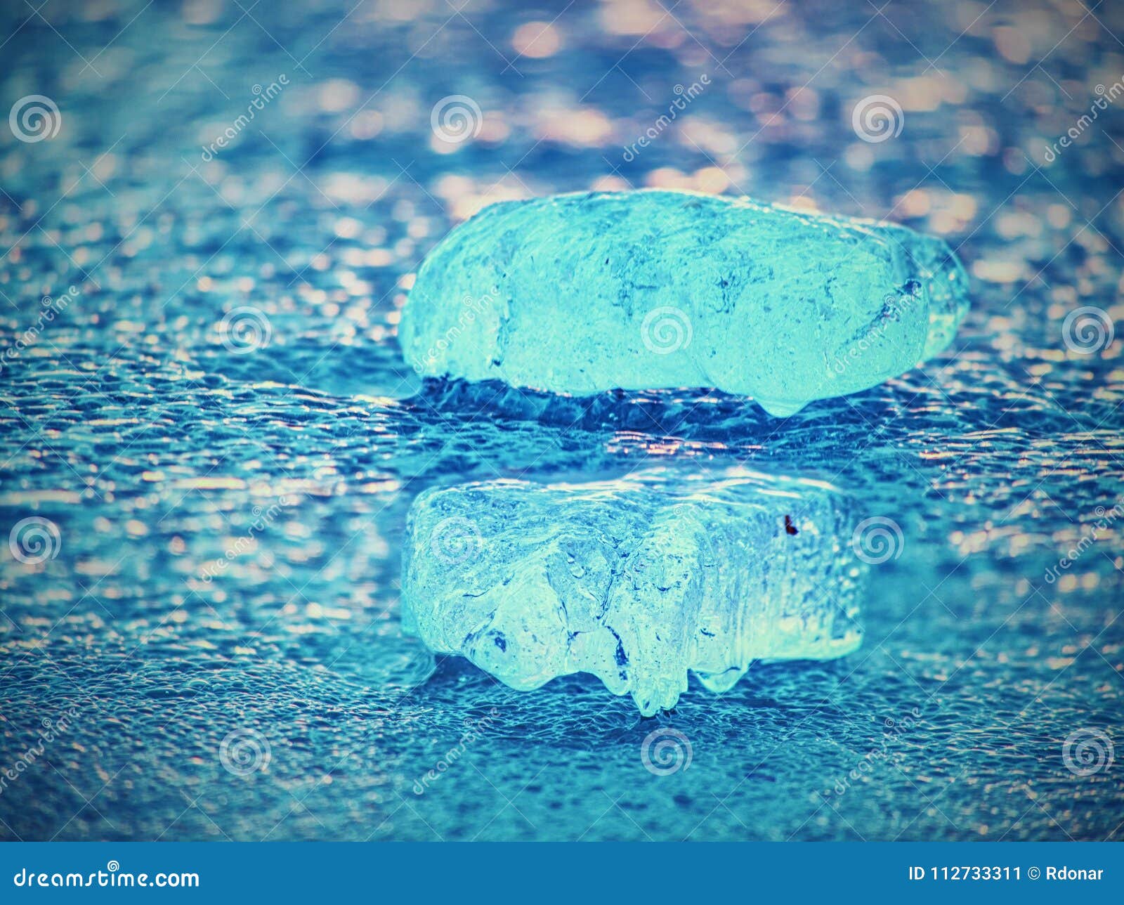 Shining Icebergs and Ice Floes, Ice Clefts Reflected Rays in the Smooth ...