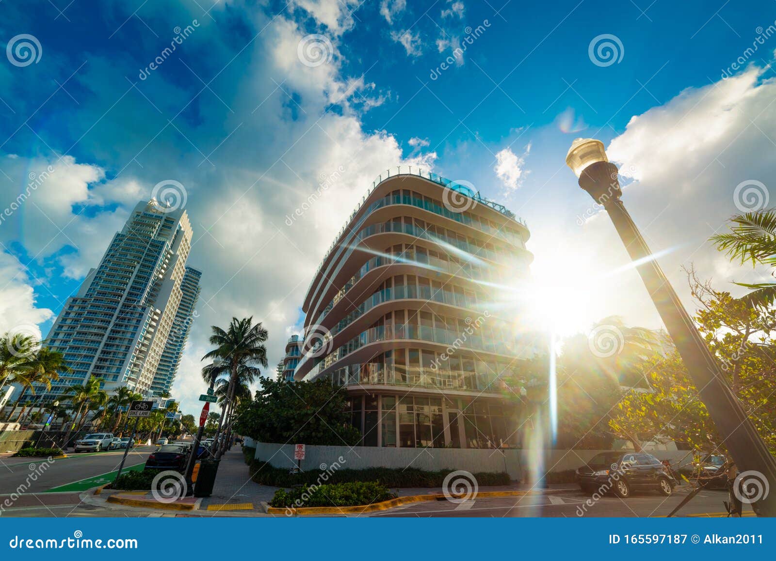 Shining Sun and Clouds Over Miami Beach at Sunset Stock Image - Image ...