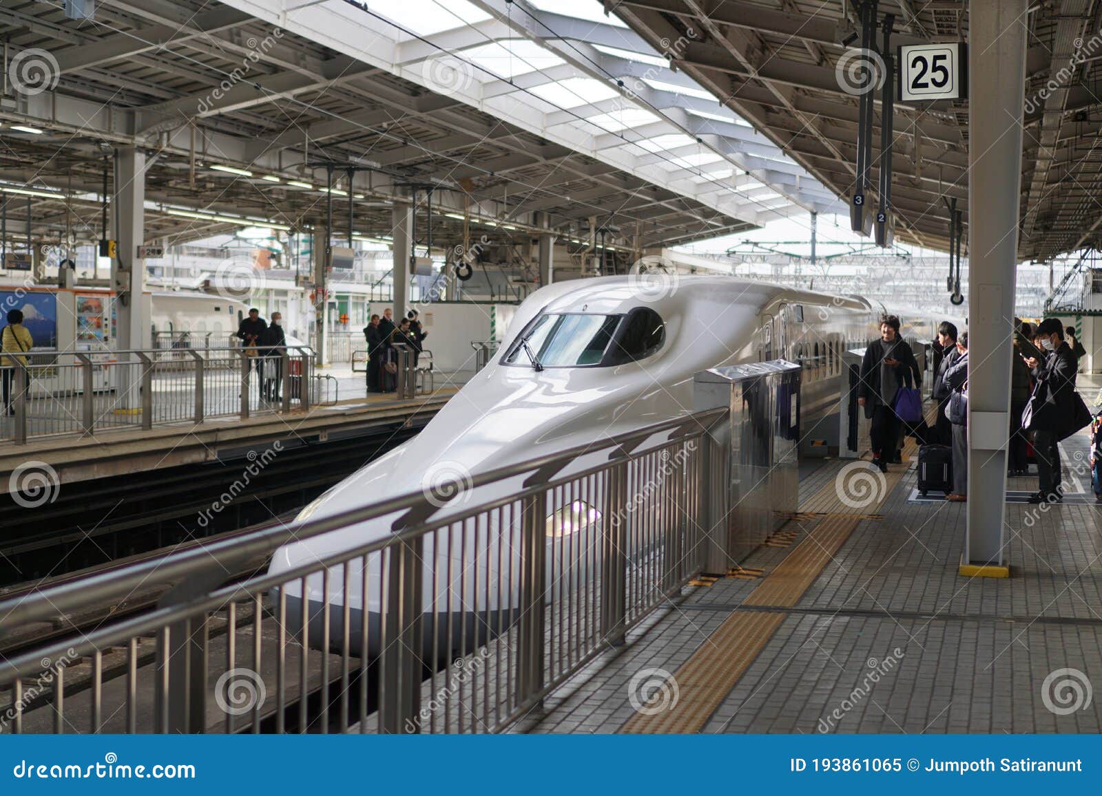 Shinkansen Or Bullet Train Arriving On A Boarding Platform At Shin Osaka Station Editorial Image
