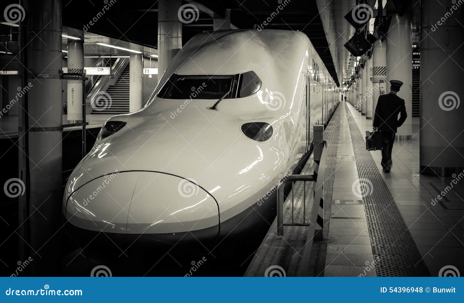 Shinkansen (Bullet Train) and Conductor Walking in Ueno Station Stock ...