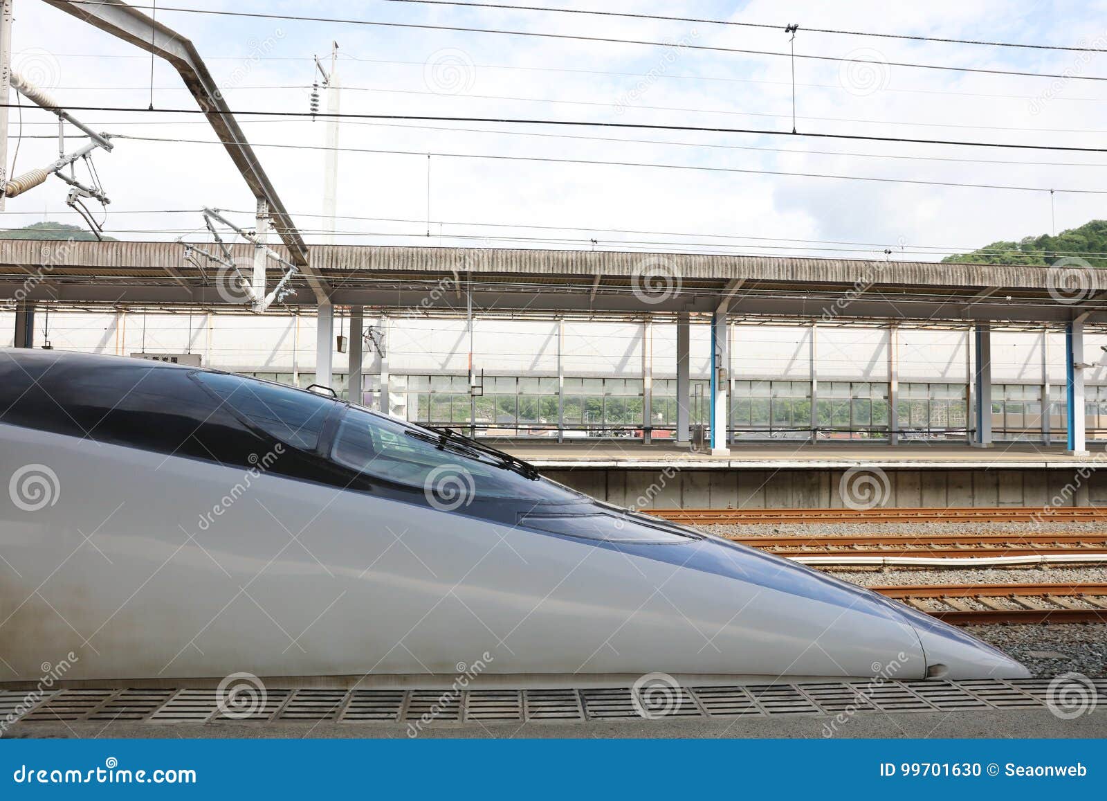 Shinkansen Or A Japanese Bullet Train Stops At Shinyokohama Station ...