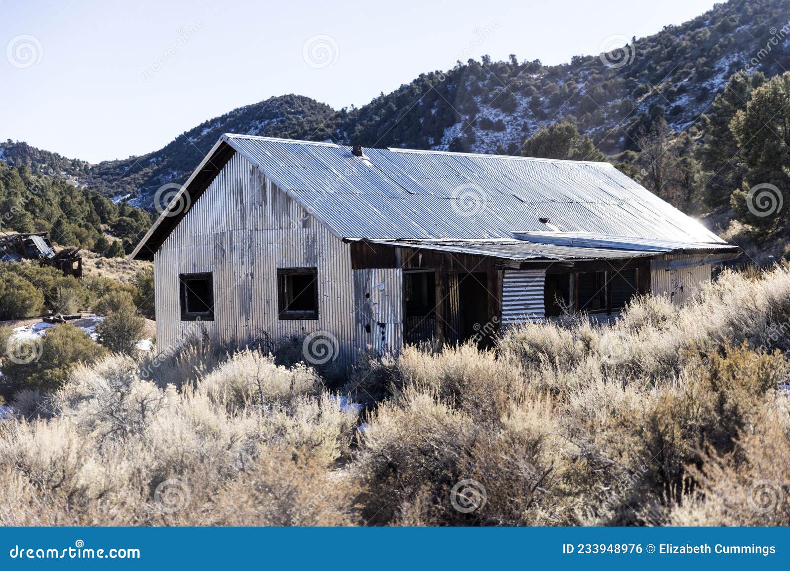 Shiny Abandoned Shack Covered in Aluminum Siding in the Desert Stock ...