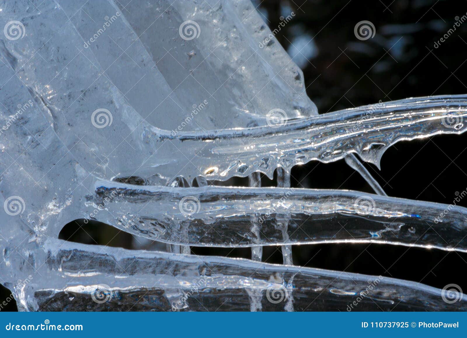 Close Up of Shiny and Blue Icicles with a Dark Background Stock Image ...