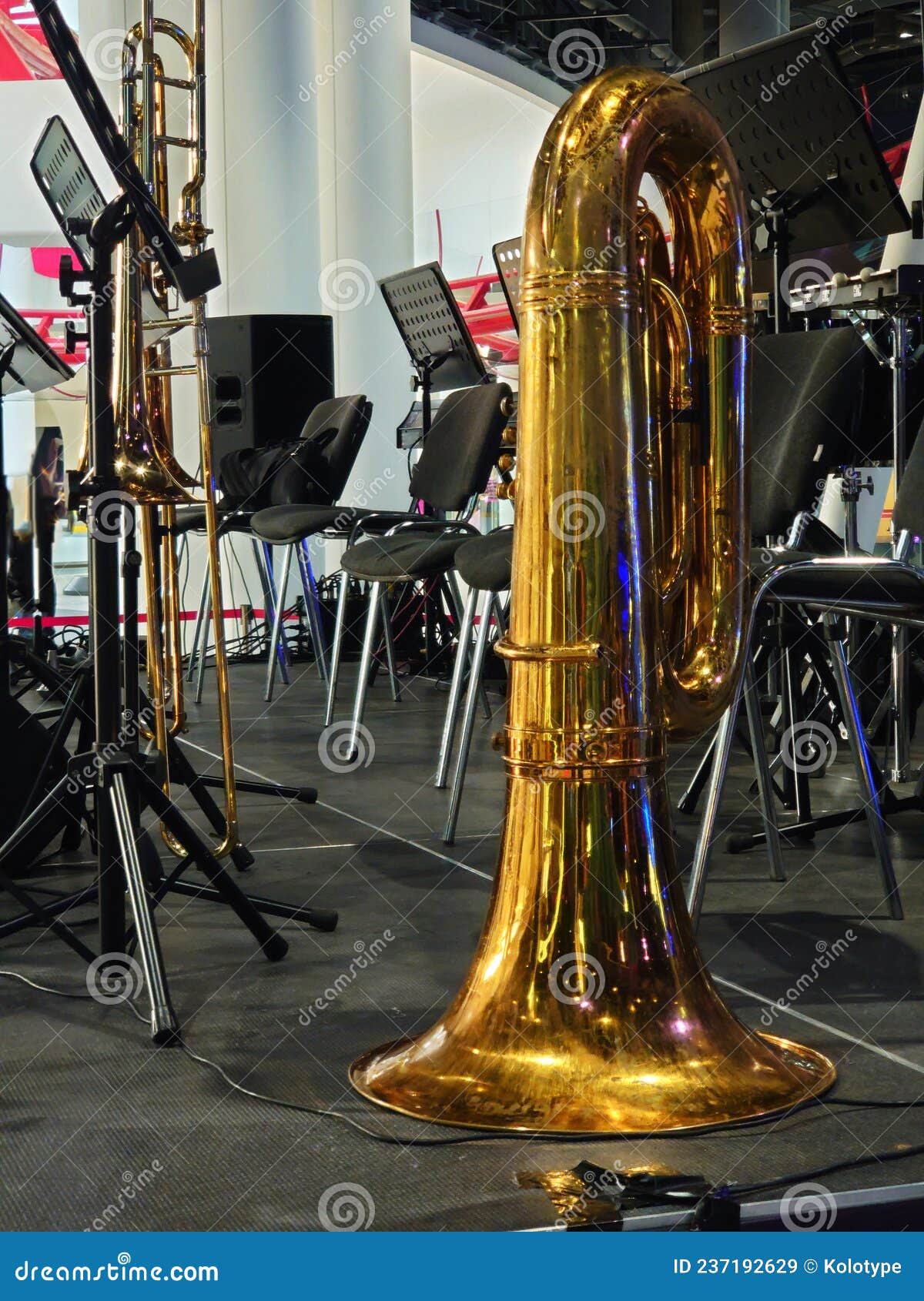 Shiny Brass Trombone Standing on a Stage Floor Editorial Stock Image ...