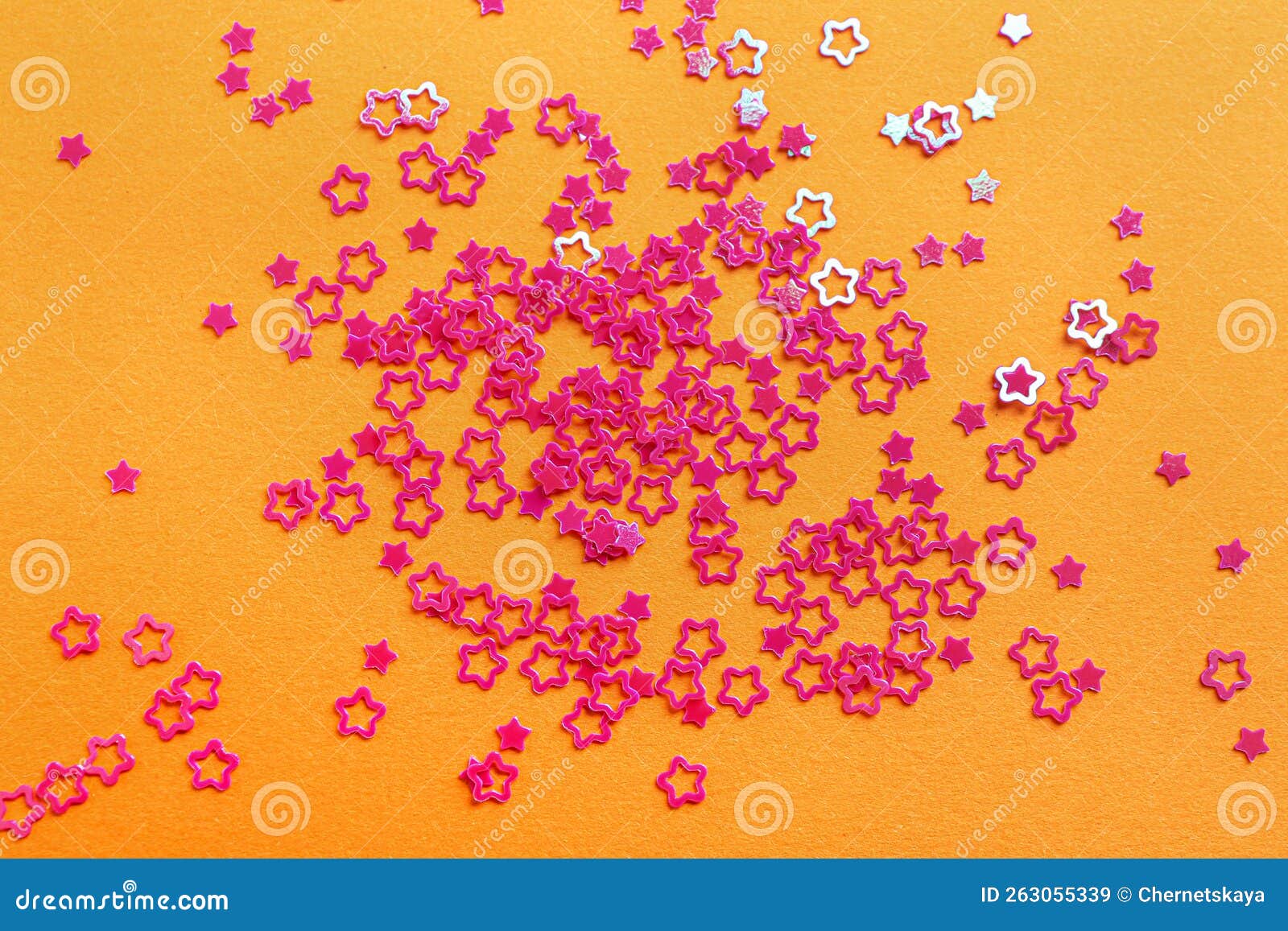 Shiny Bright Star Shaped Glitter on Pale Orange Background Stock Image ...