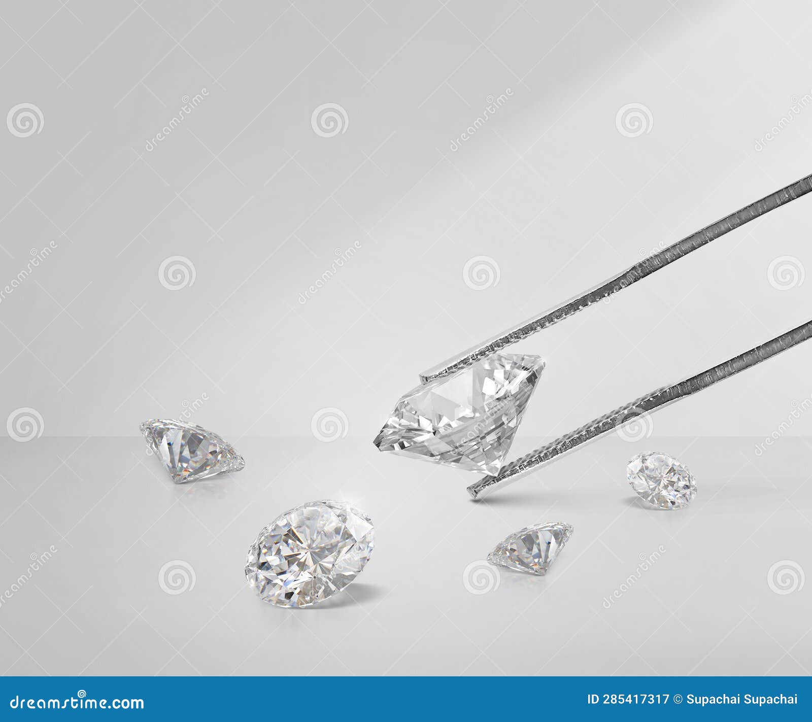 Shiny Brilliant Diamond in Diamond Tweezers, and Round Diamond with ...