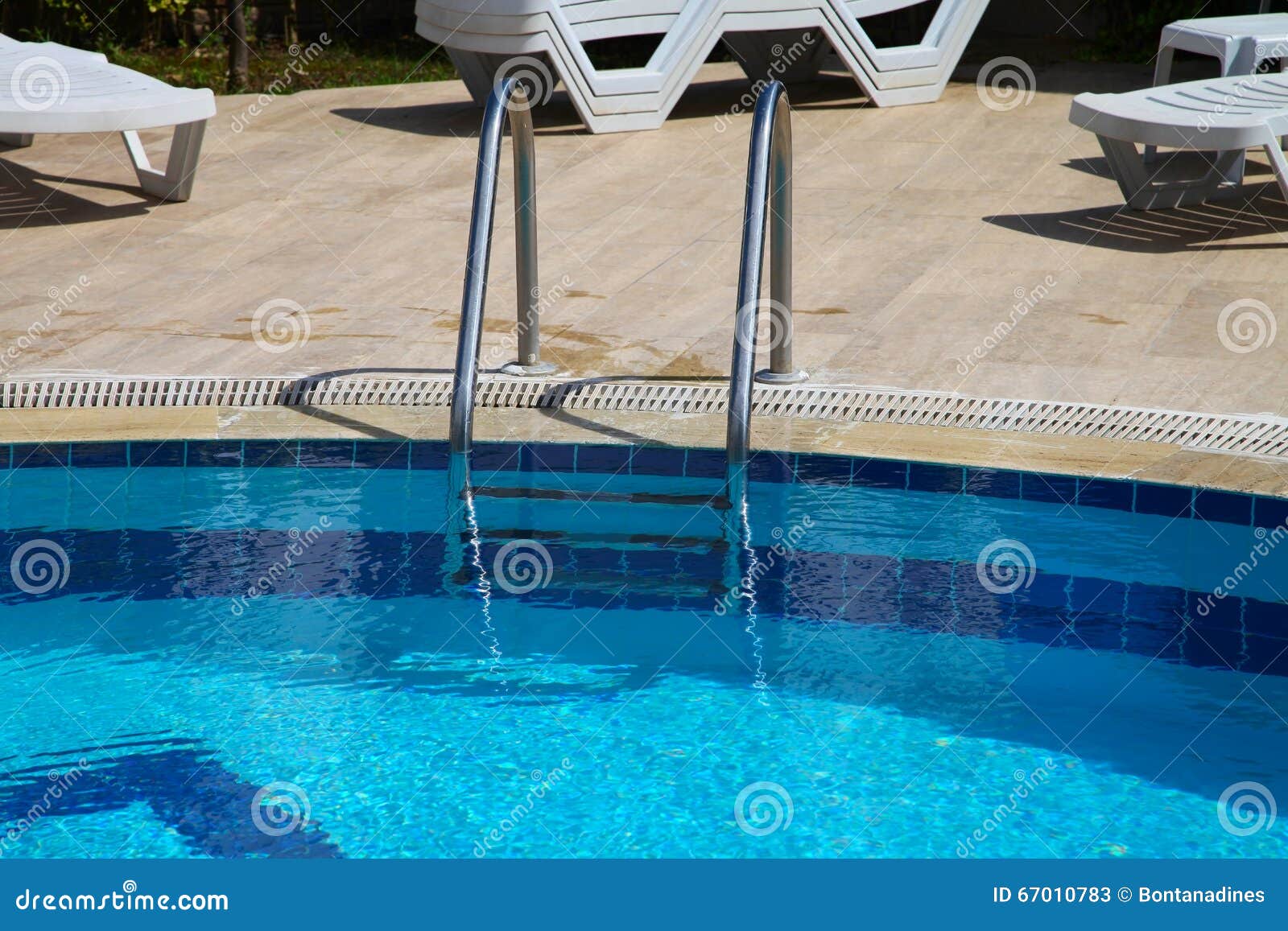 Shiny Chrome Ladder in the Pool with Blue Water Stock Image - Image of ...