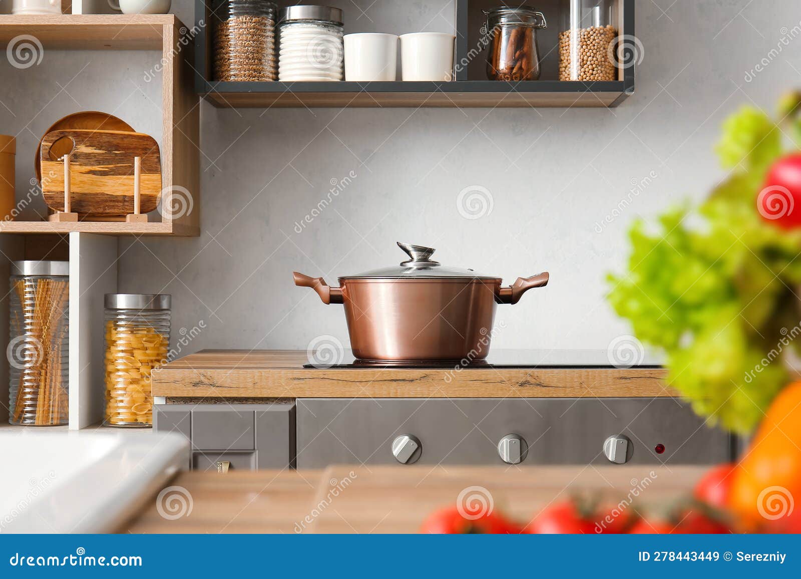 Shiny Cooking Pot on Stove in Modern Kitchen Stock Image - Image of ...
